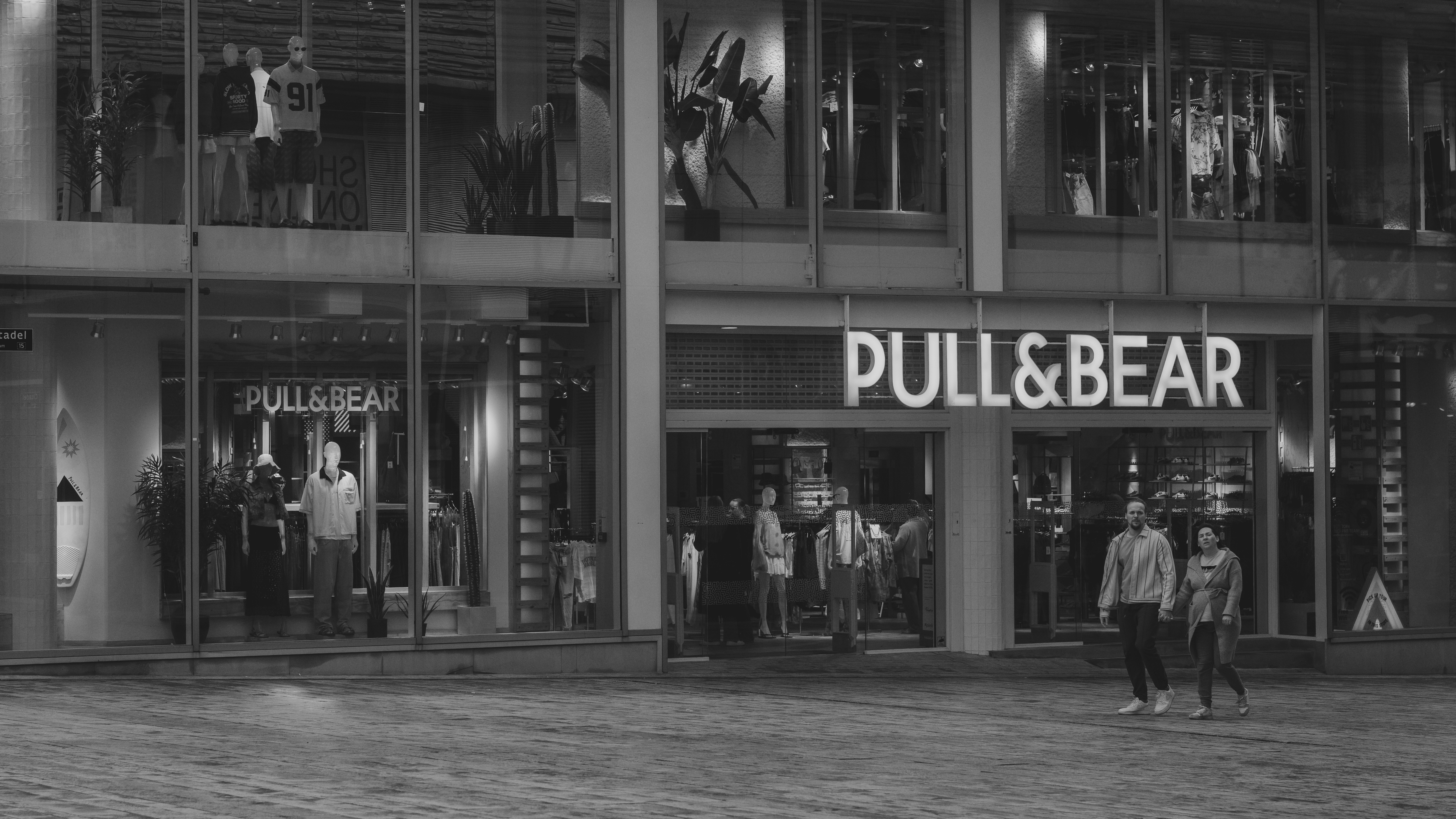 Shopping Mall | A pull&bear store at night is displayed.