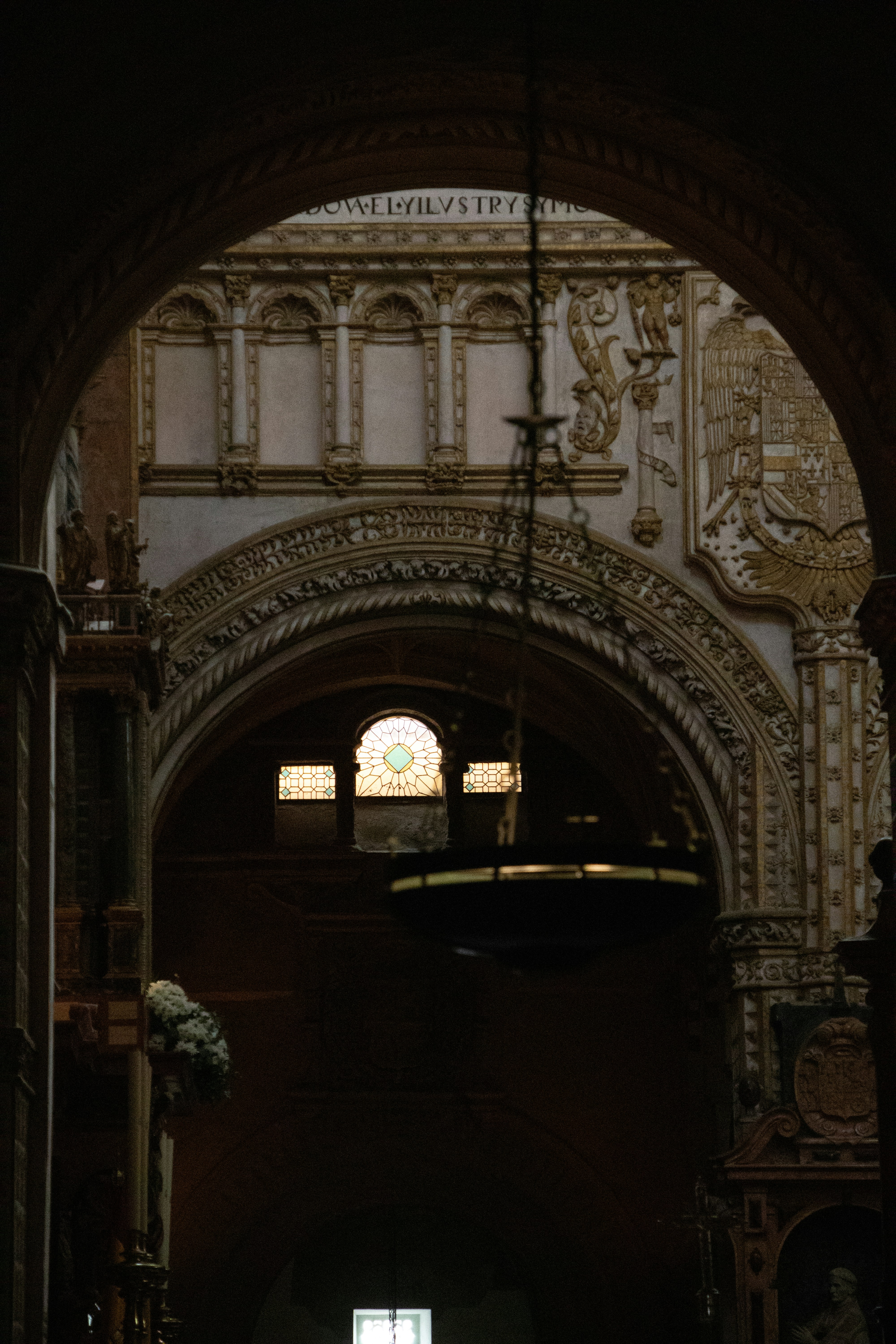 Inside of an ornate, arched church interior.