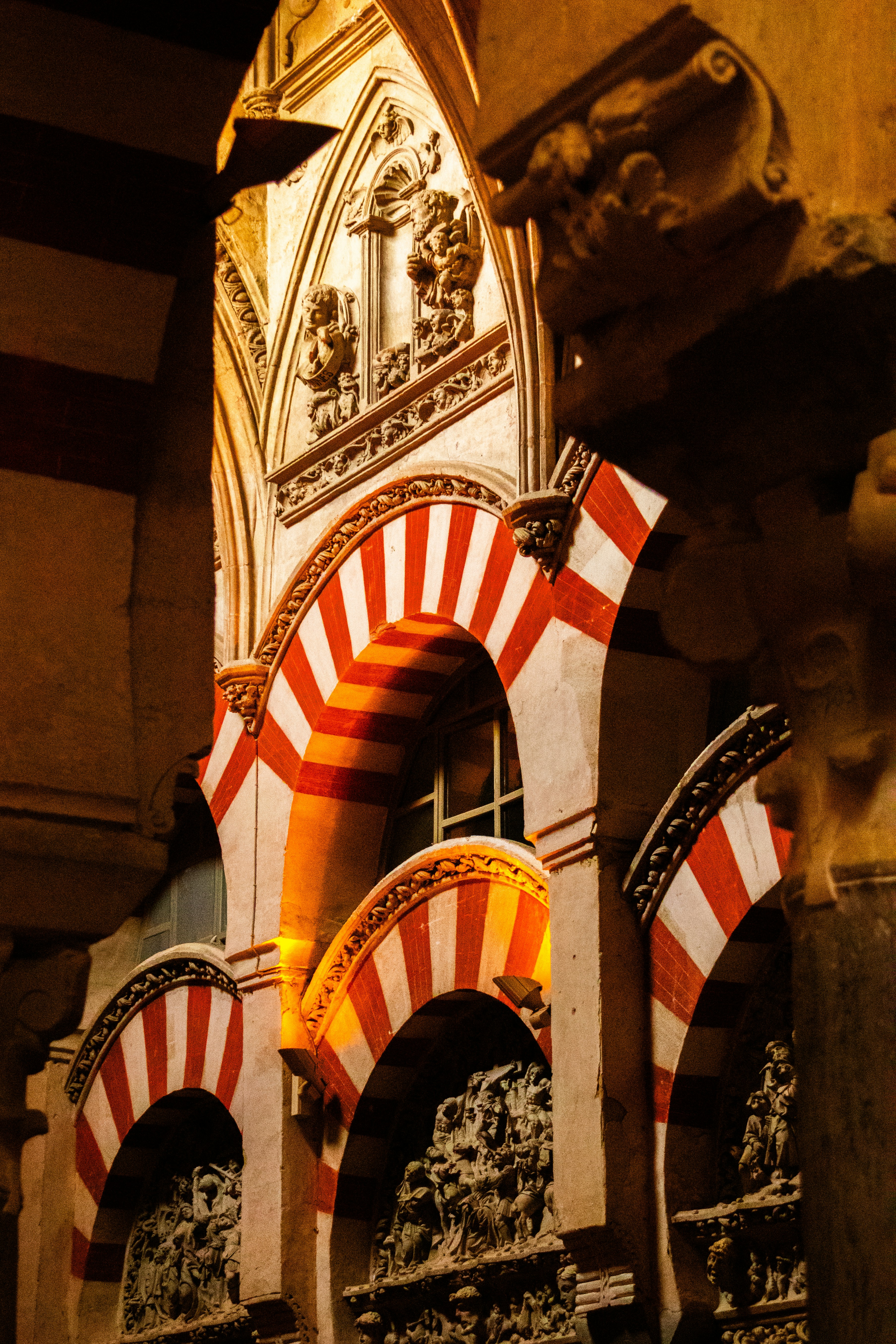 The colorful arches of a historical building.
