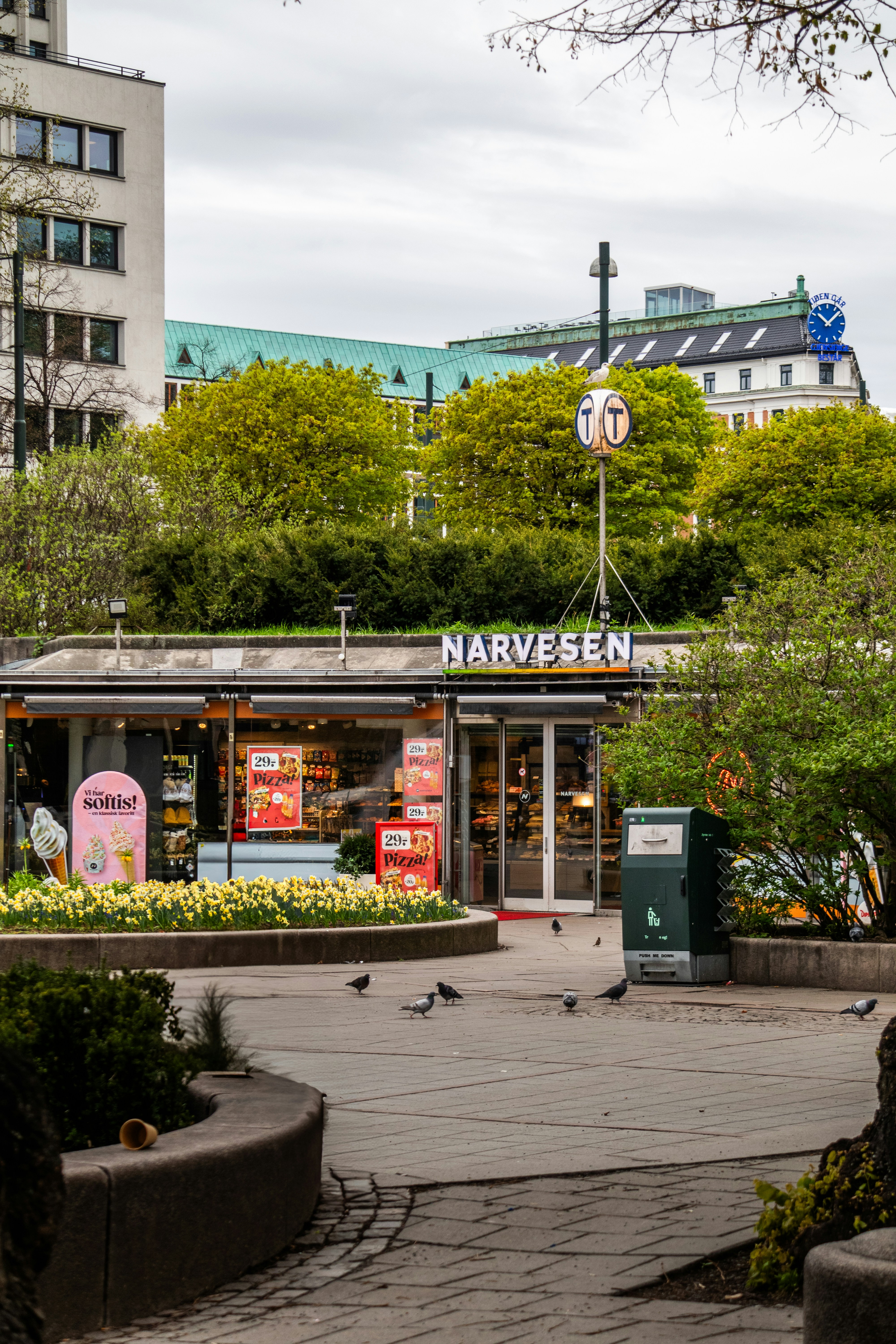Narvesen Shopfront in a Green Urban Clutter