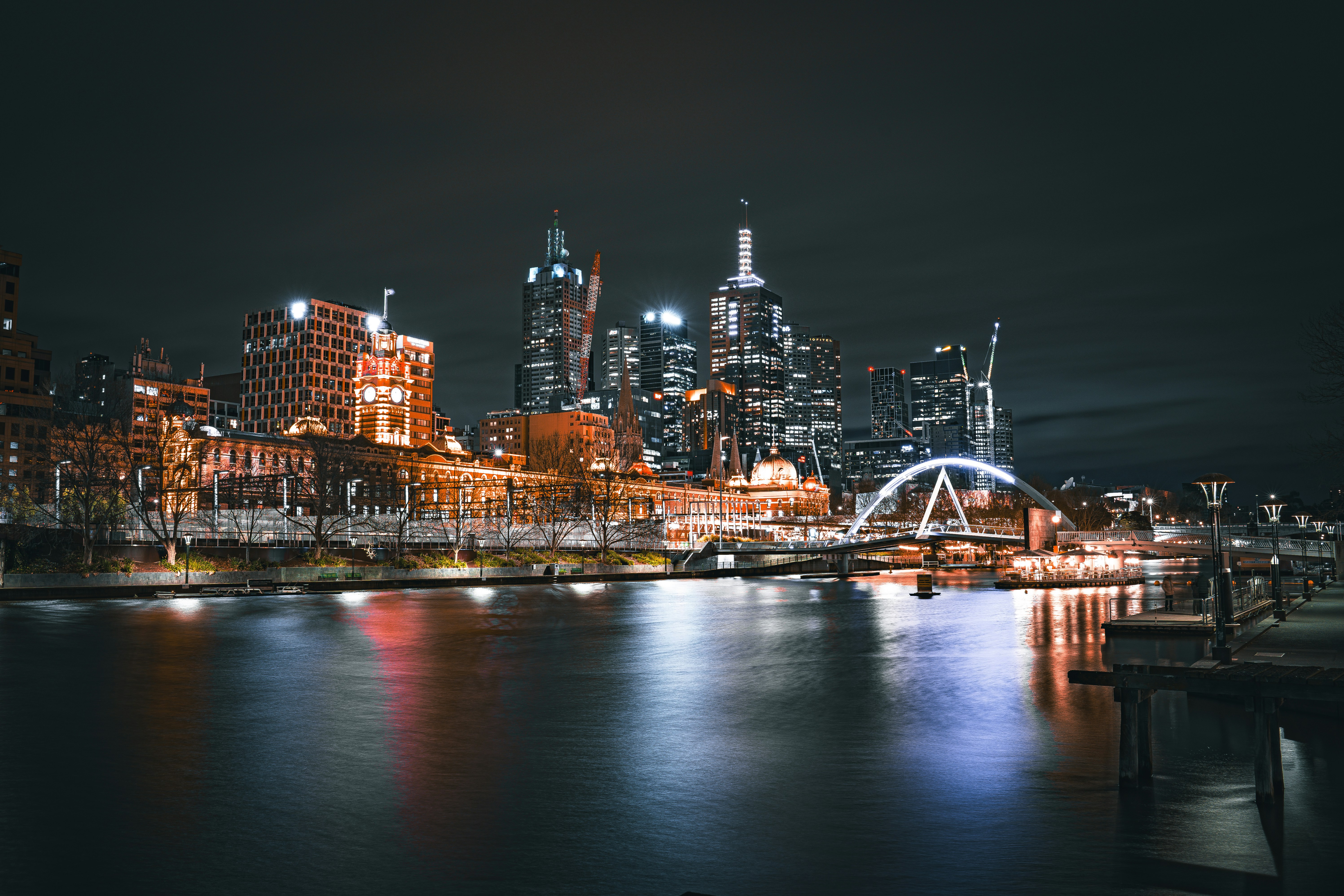 Night in southbank, it has city view and Yarra river in Melbourne | City skyline lights reflect on the water at night.