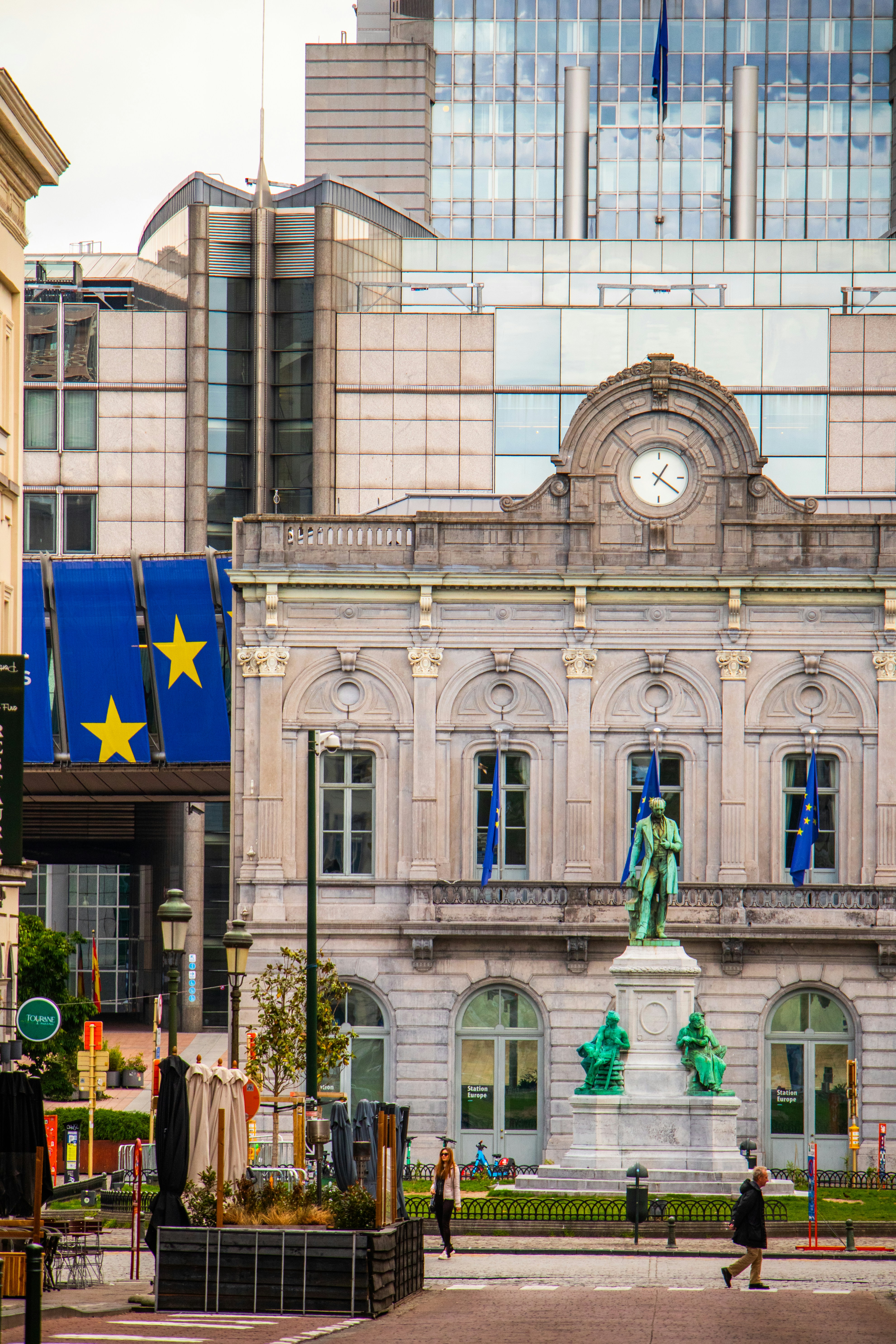 Patinated Guardian Over a European City Hall Plaza