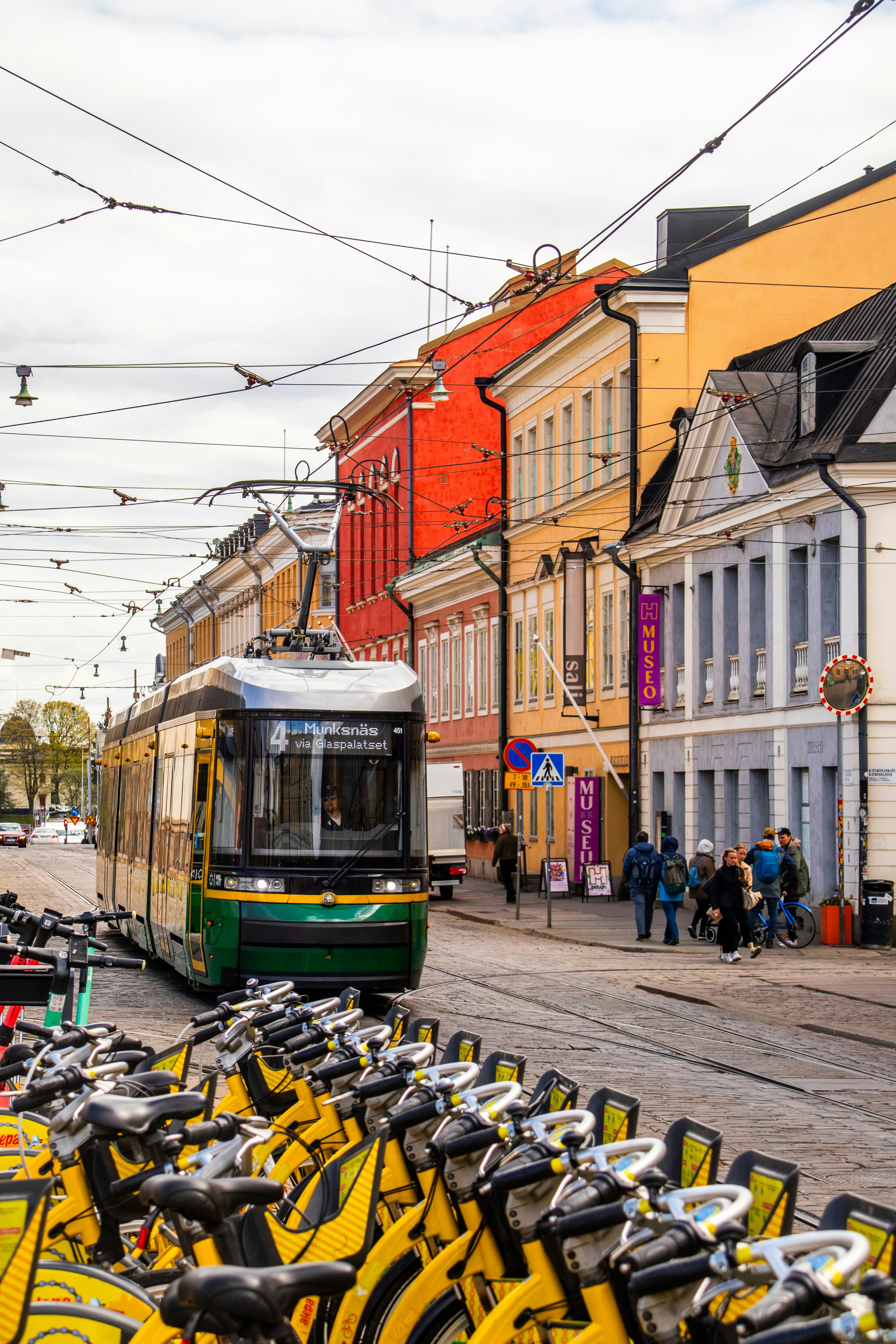 Urban Rhythm: The Dance of Tram and Bikes