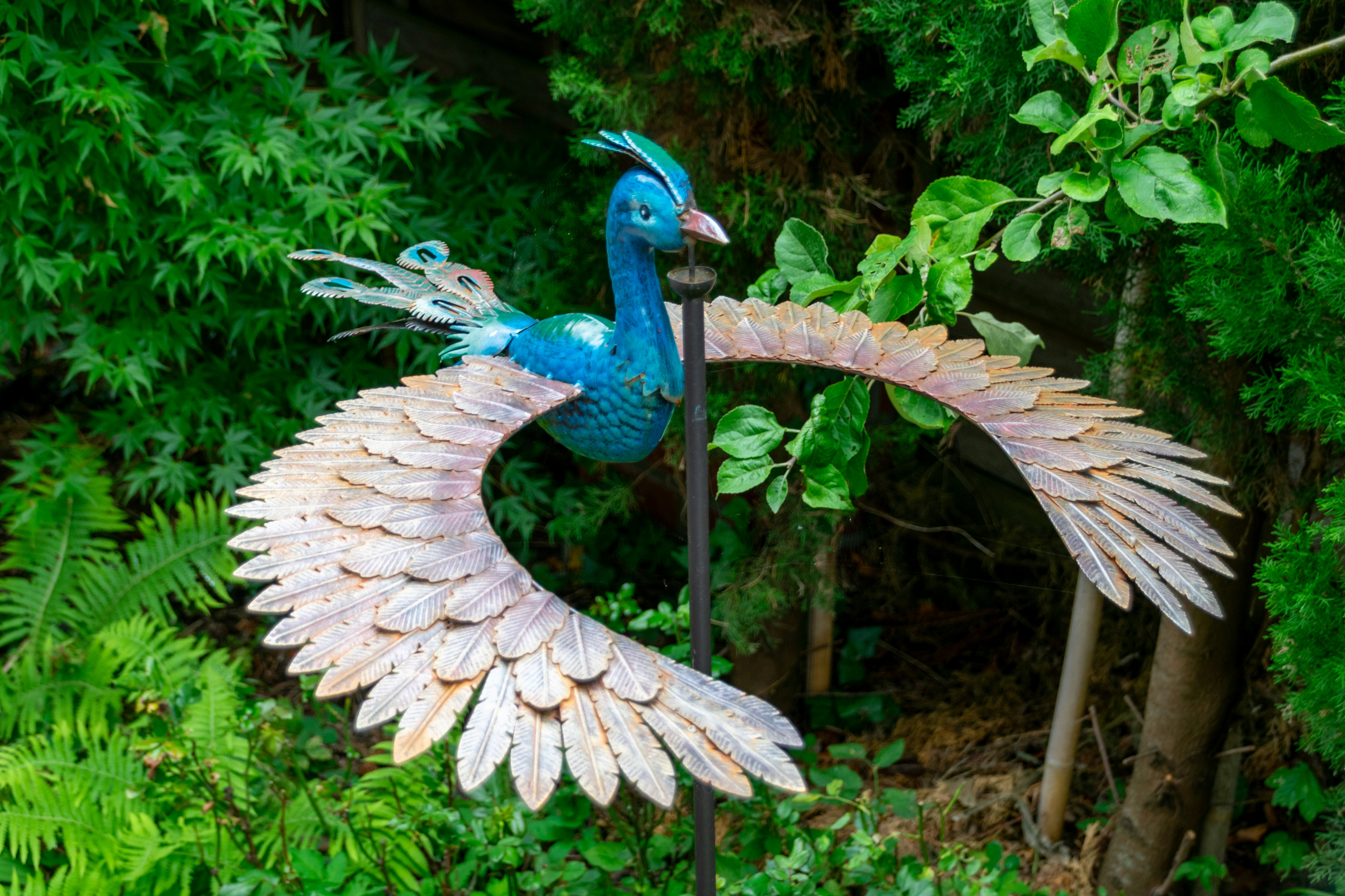 Whimsical Dance of the Metal Peacock