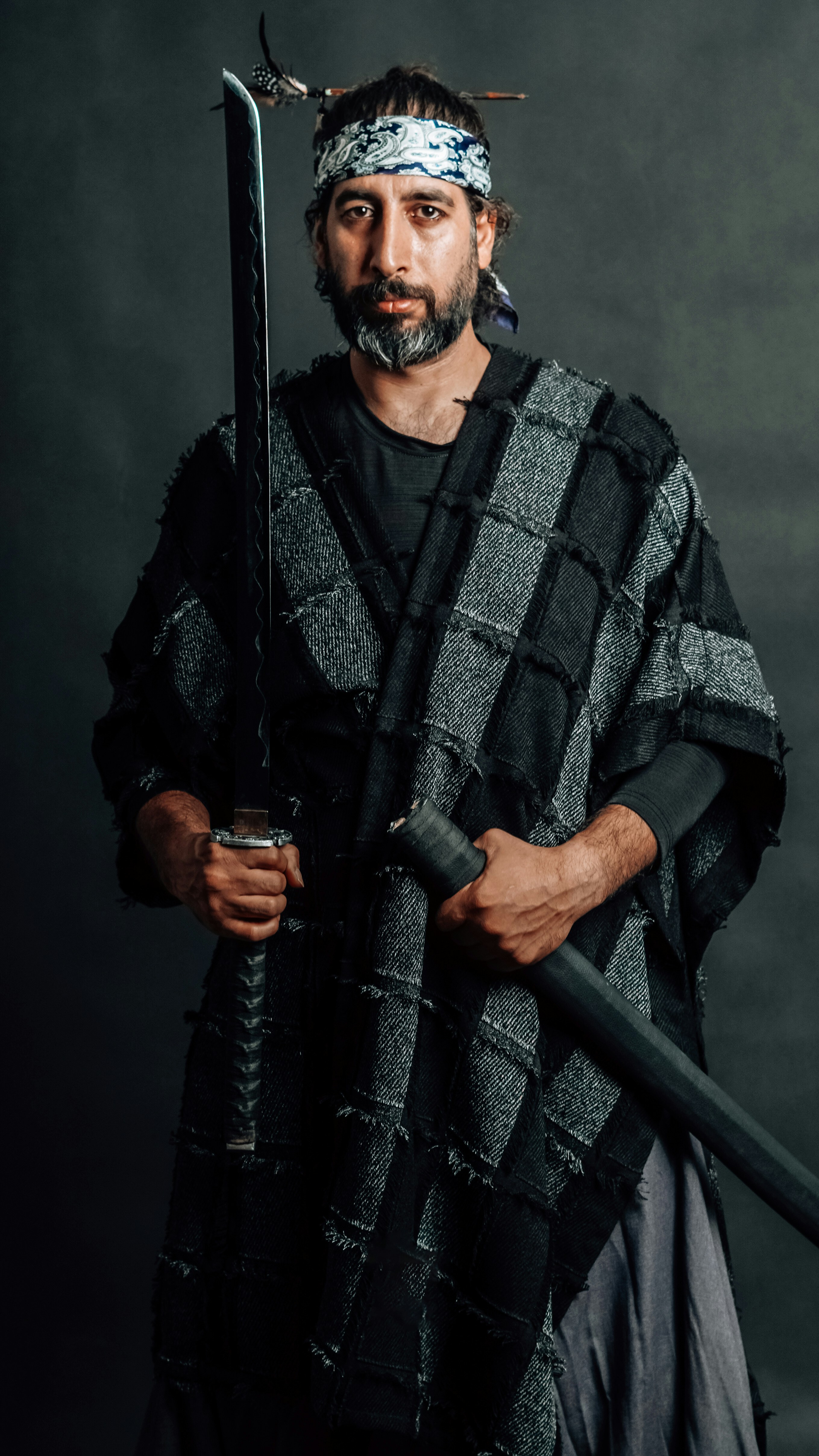 Warrior with Sword: A Portrait in Dark Textiles