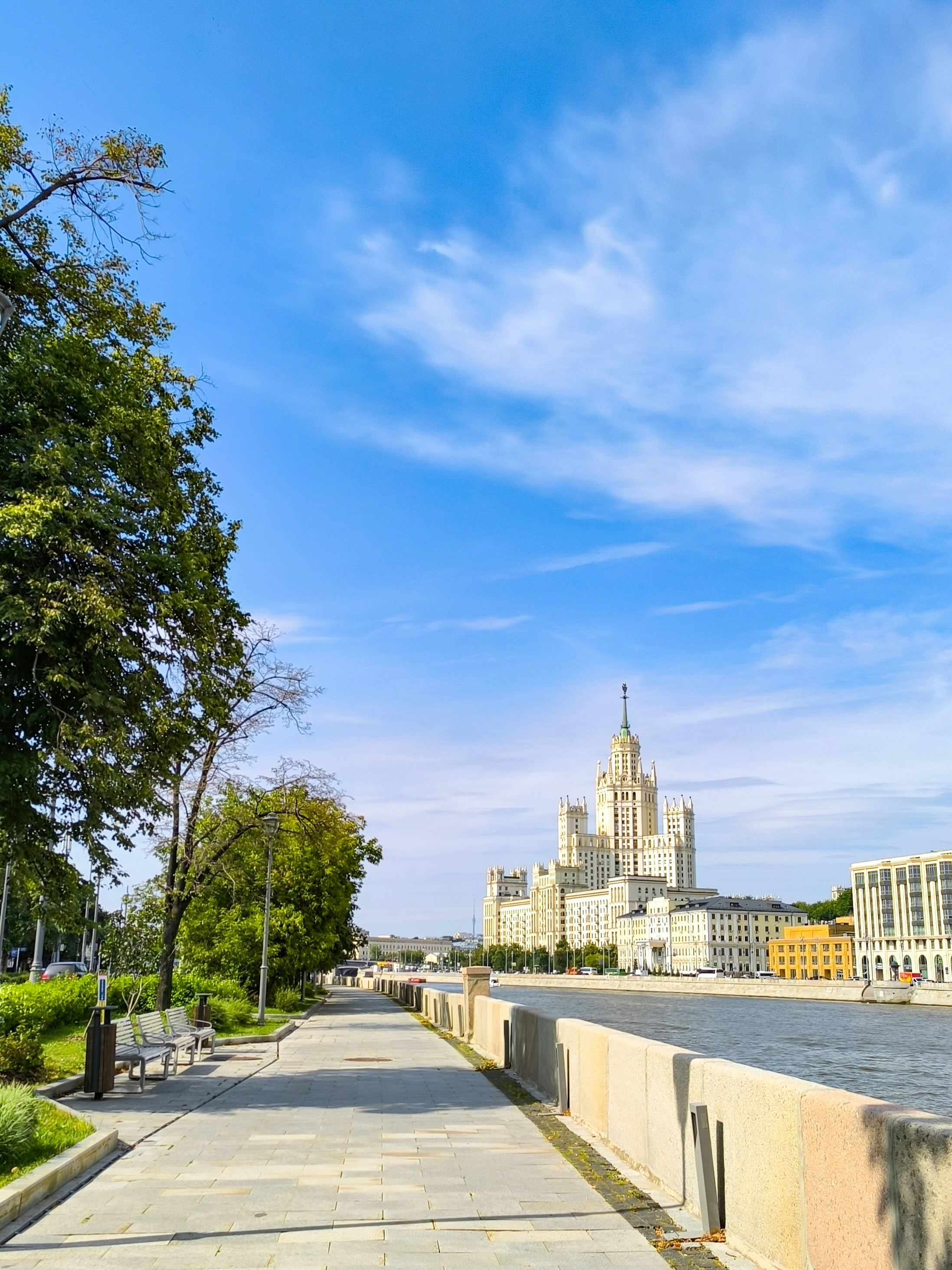 A scenic view of a river and building.