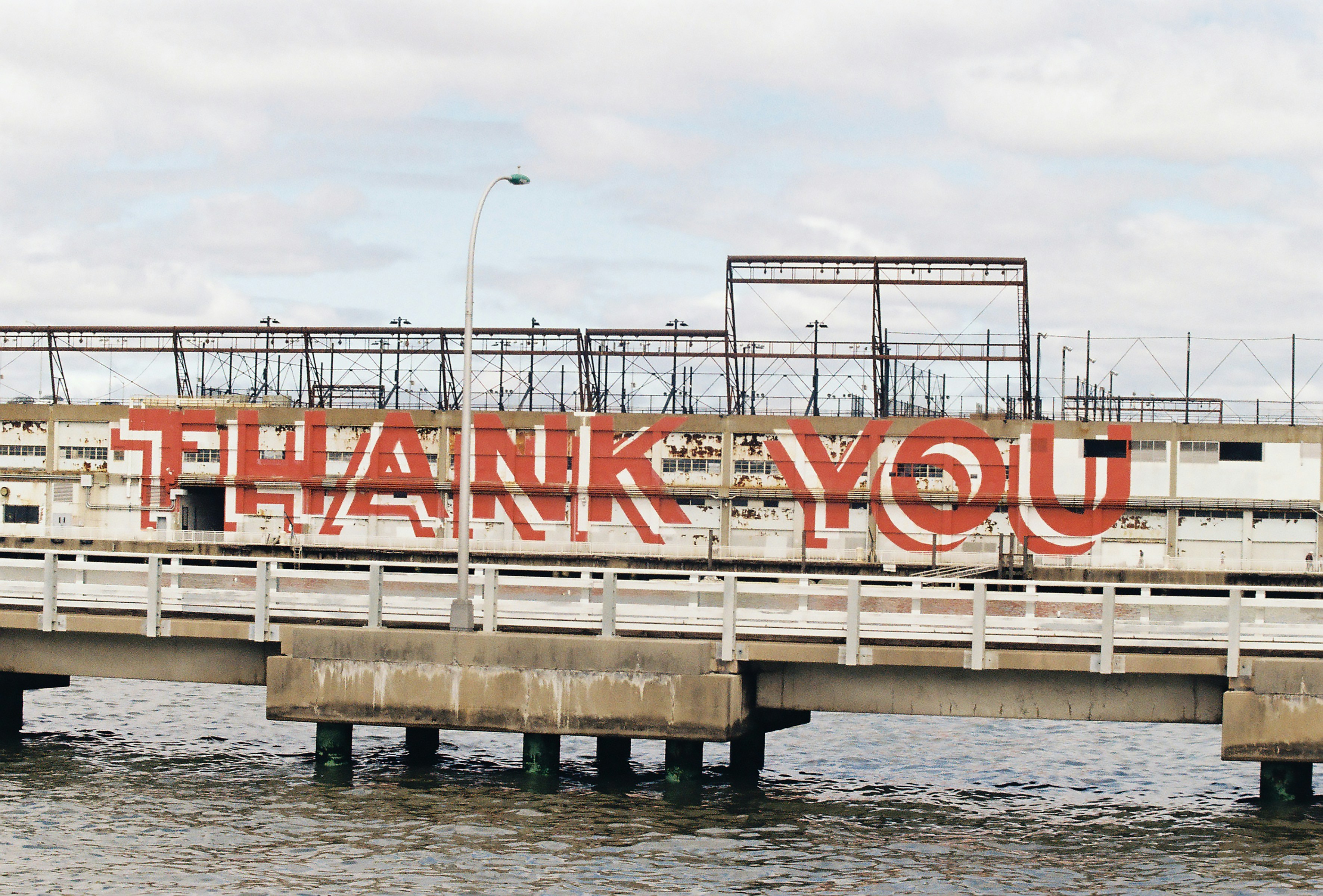 The image shows a building that says thank you. photo – Free River ...