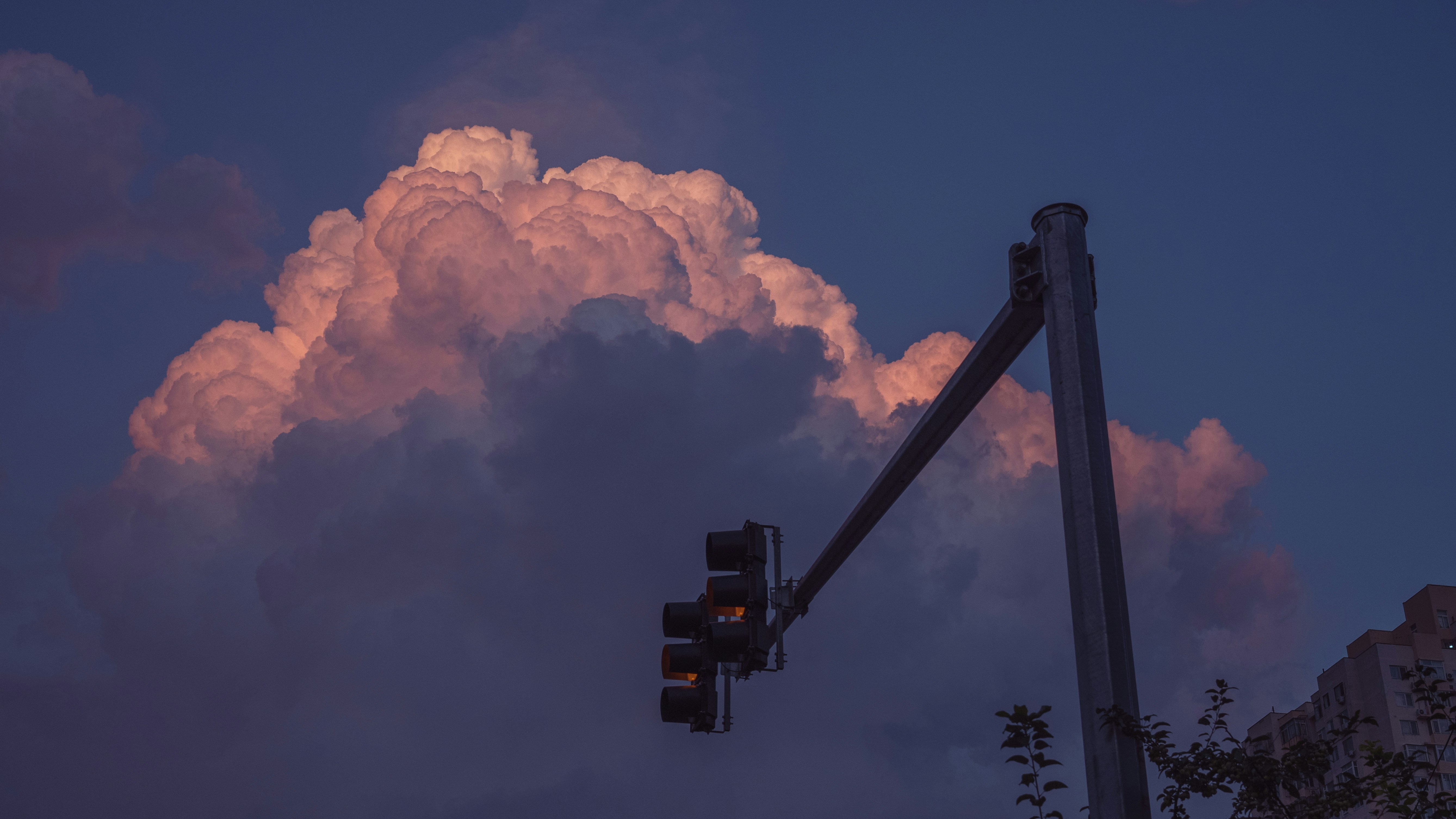 Urban Twilight: A Dance of Light and Cloud