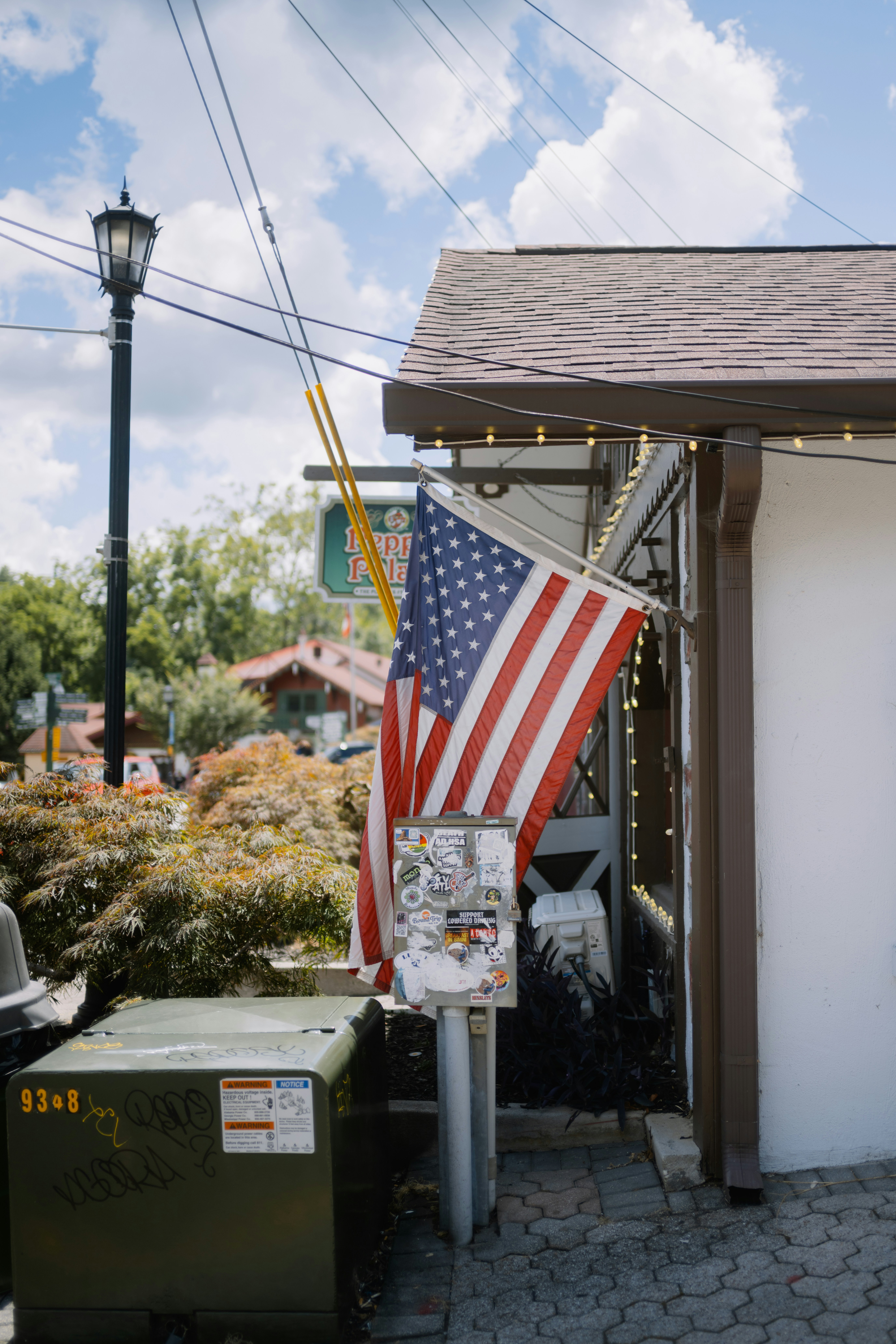 American flag hangs in front of a building.