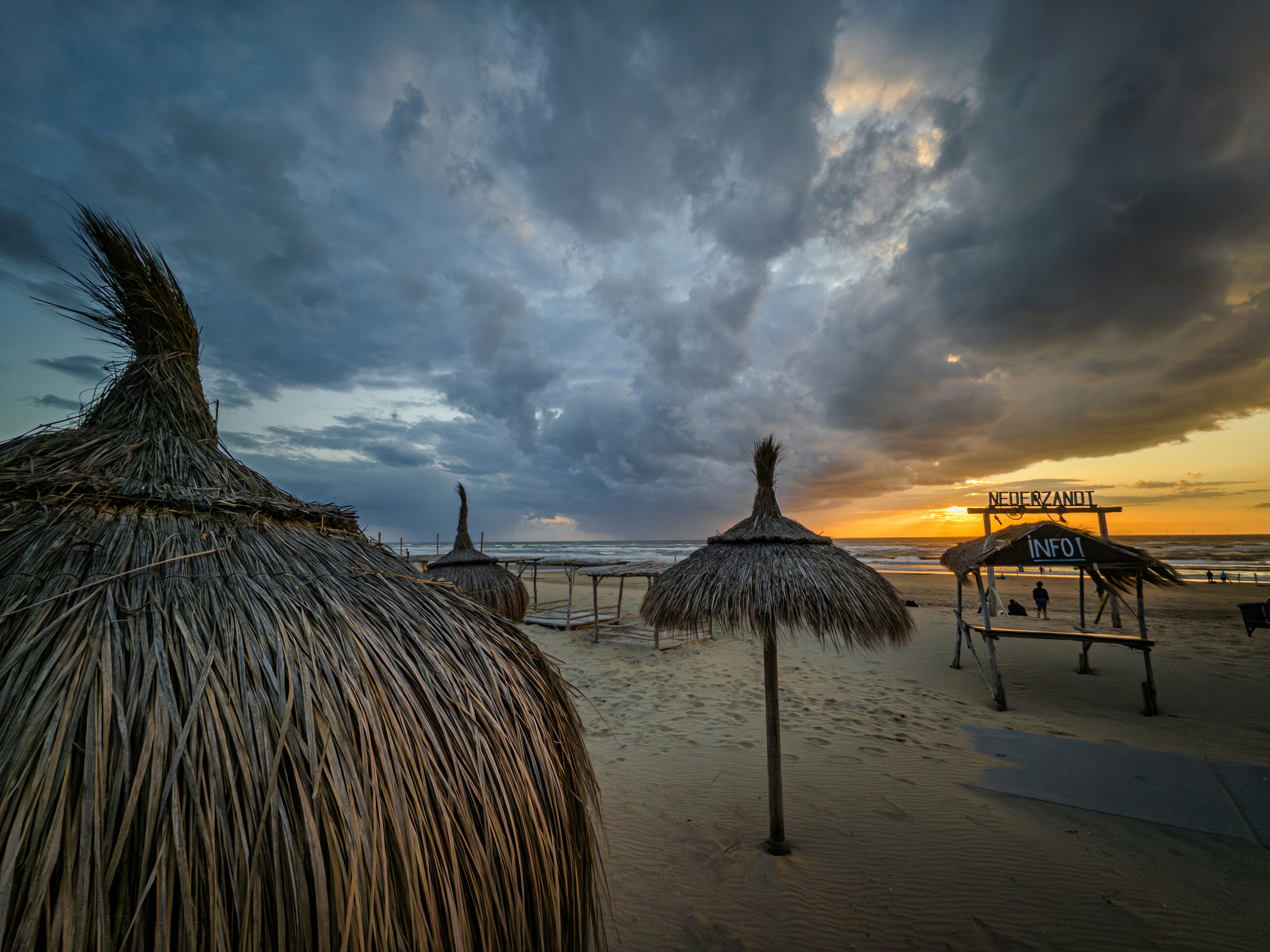 Whispers of Dusk Beneath the Tiki Huts