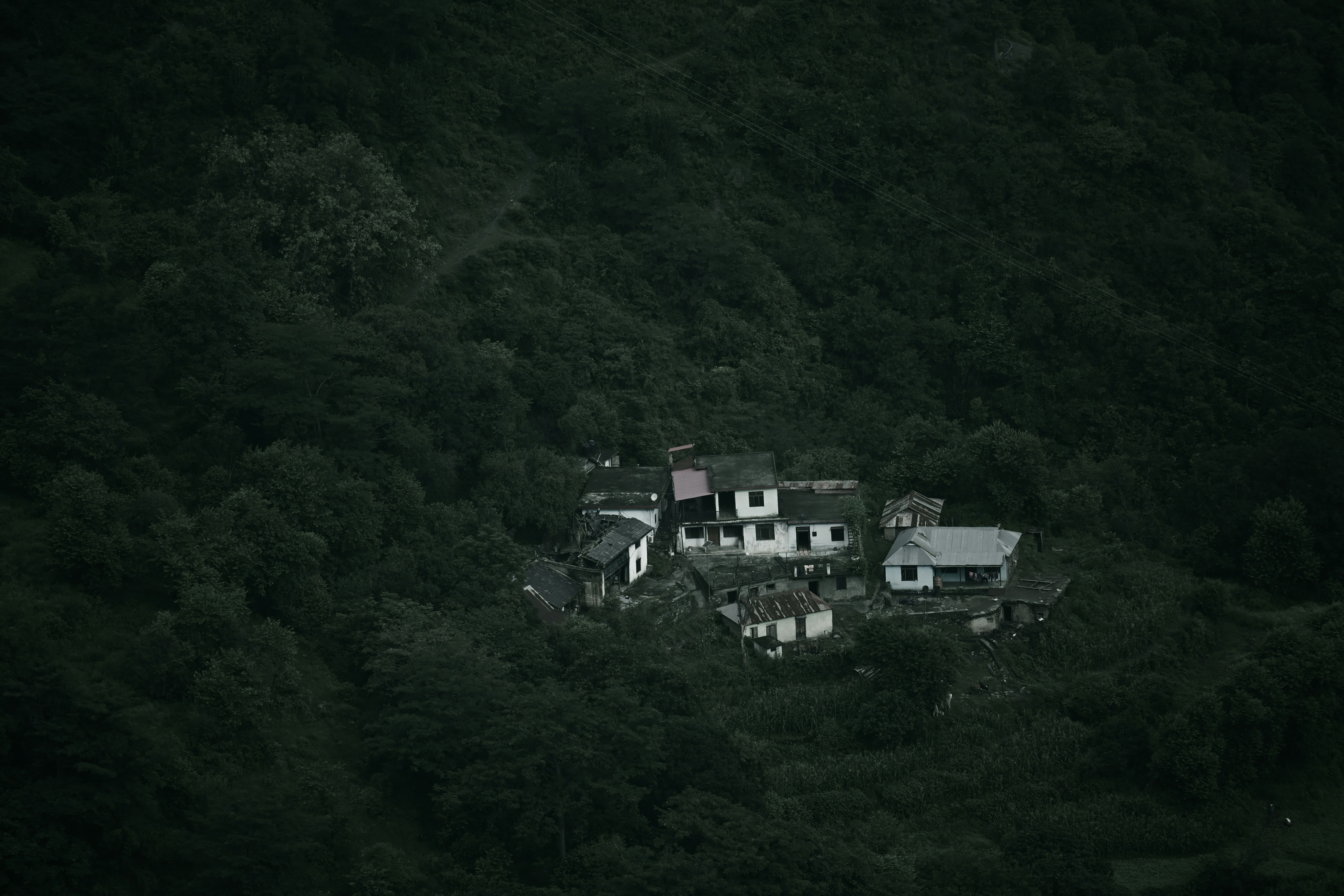House of Nature! | A village nestled among the lush green hills.