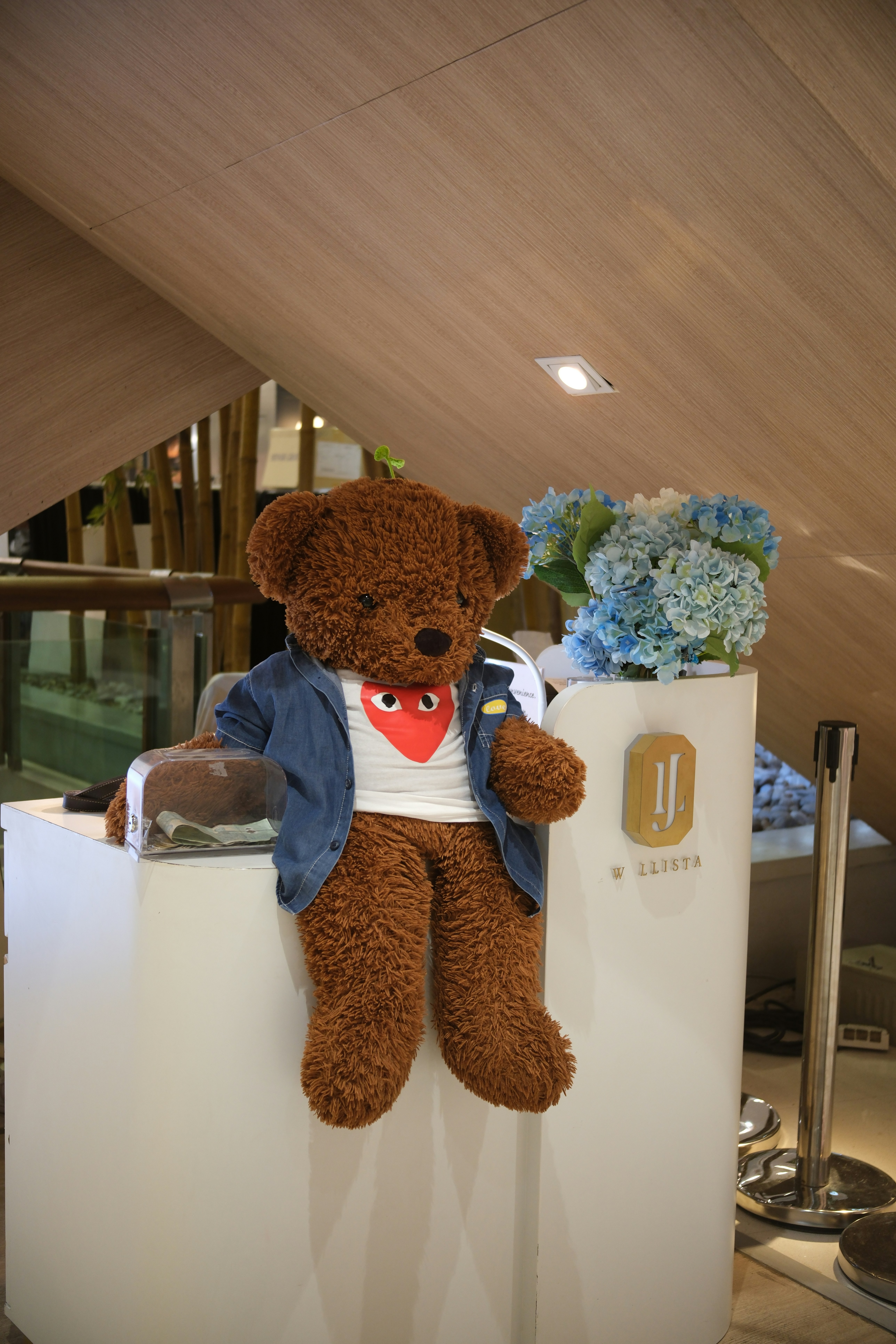 The Charming Concierge Bear