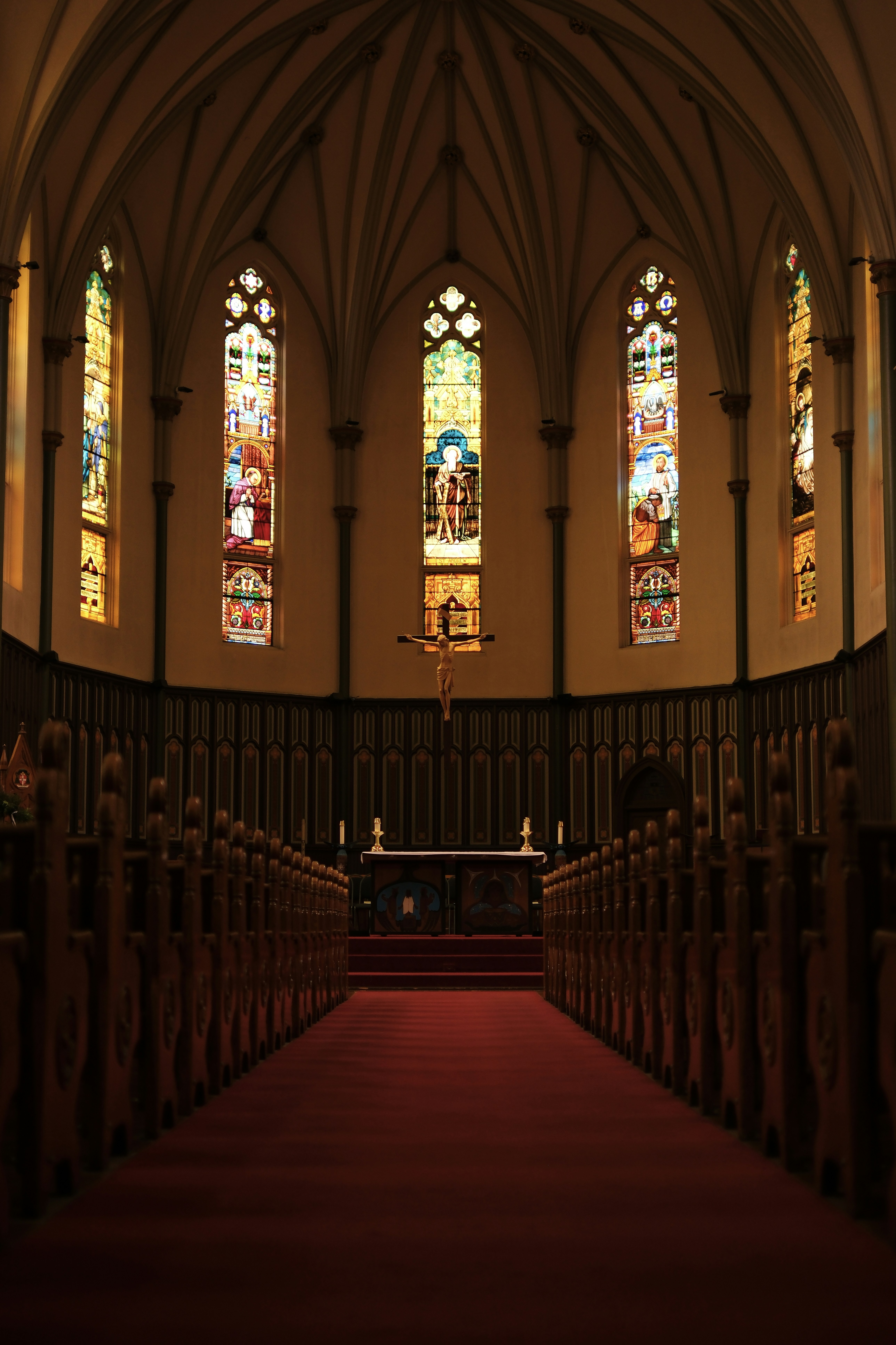 Instagram - @kaprion | Inside a church, stained glass windows glow.