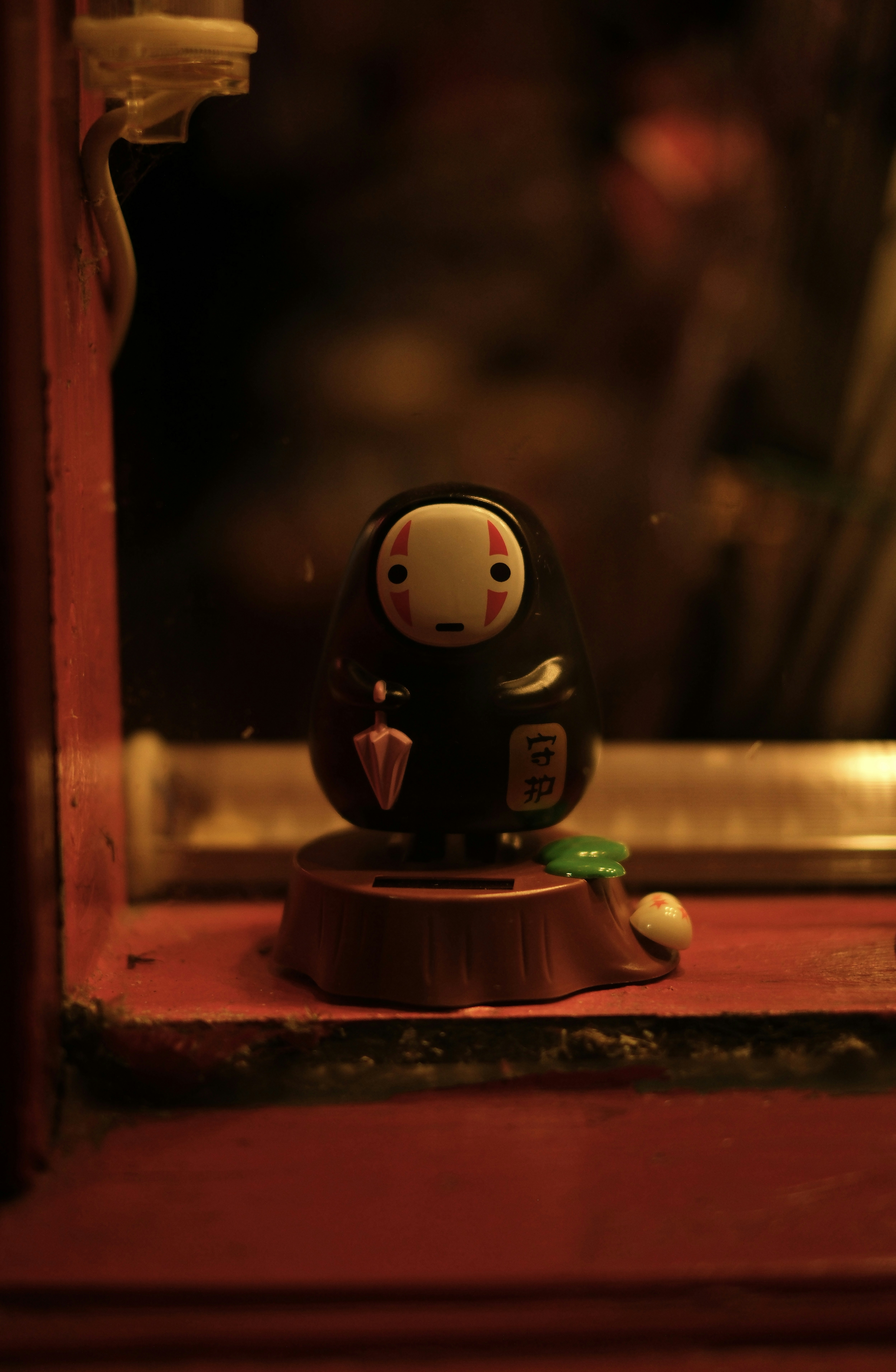 Whispers of the Shadowed Figurine