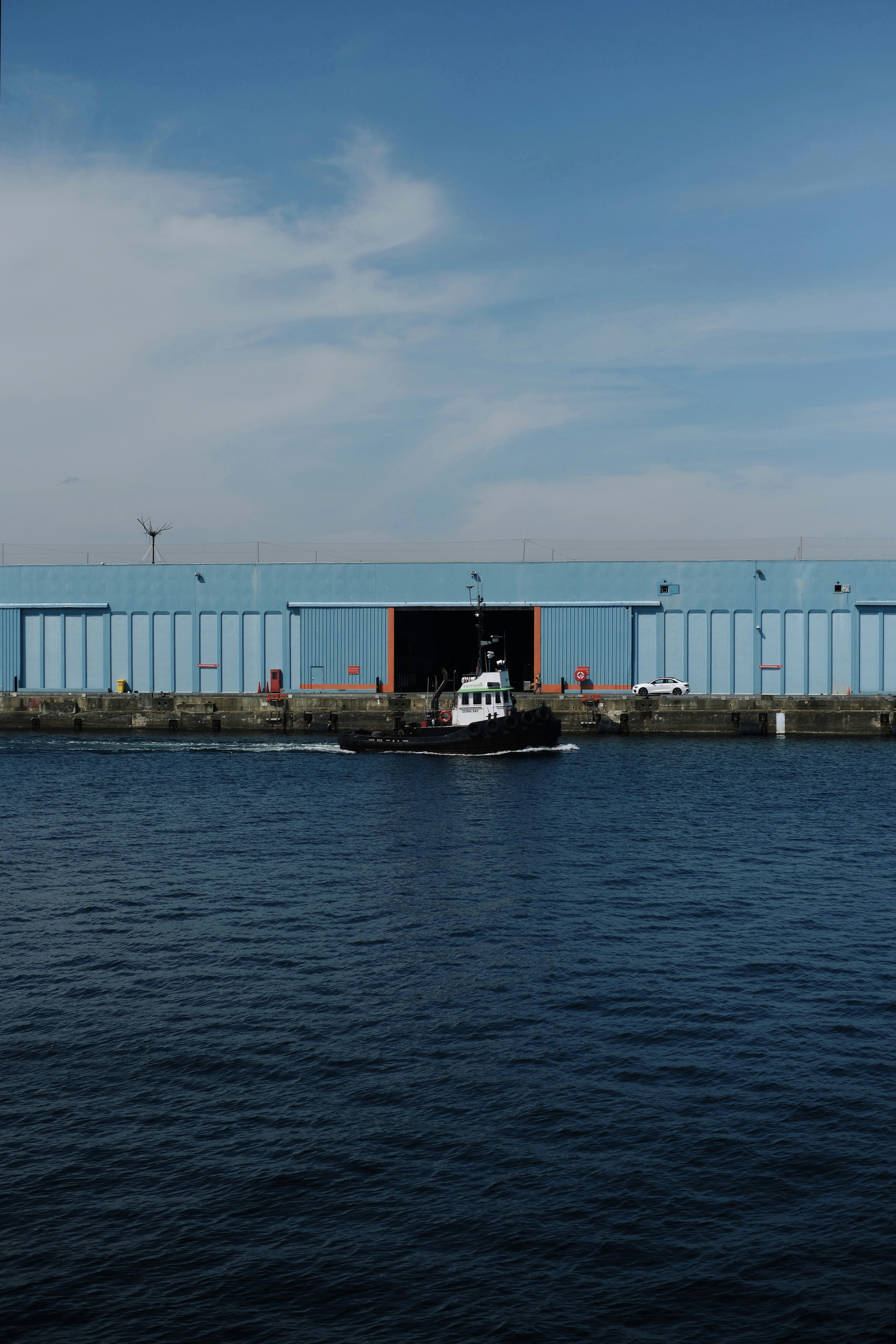 Harbor Dynamics: A Tugboat's Journey