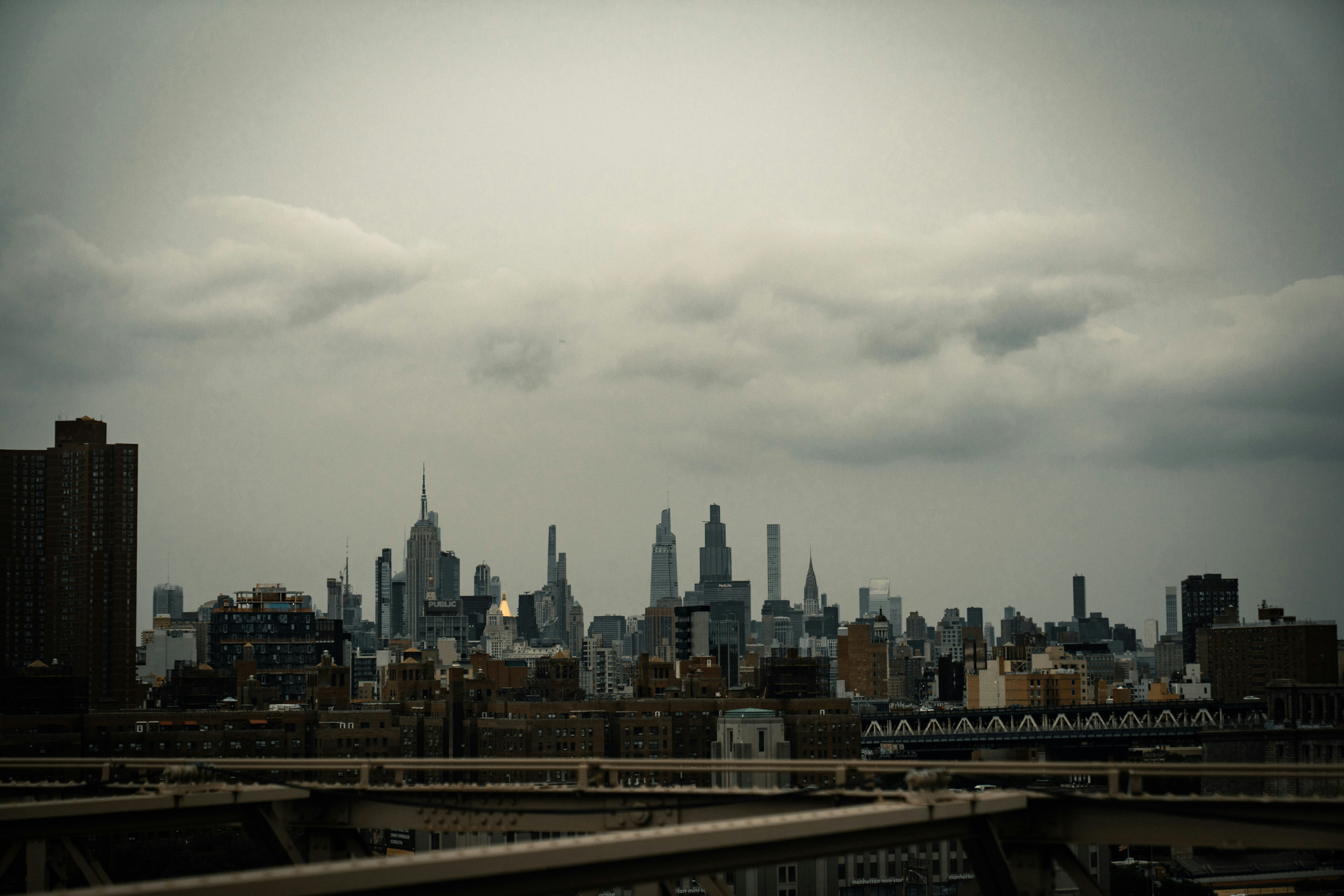 Urban Silhouettes Amidst Gloomy Skies