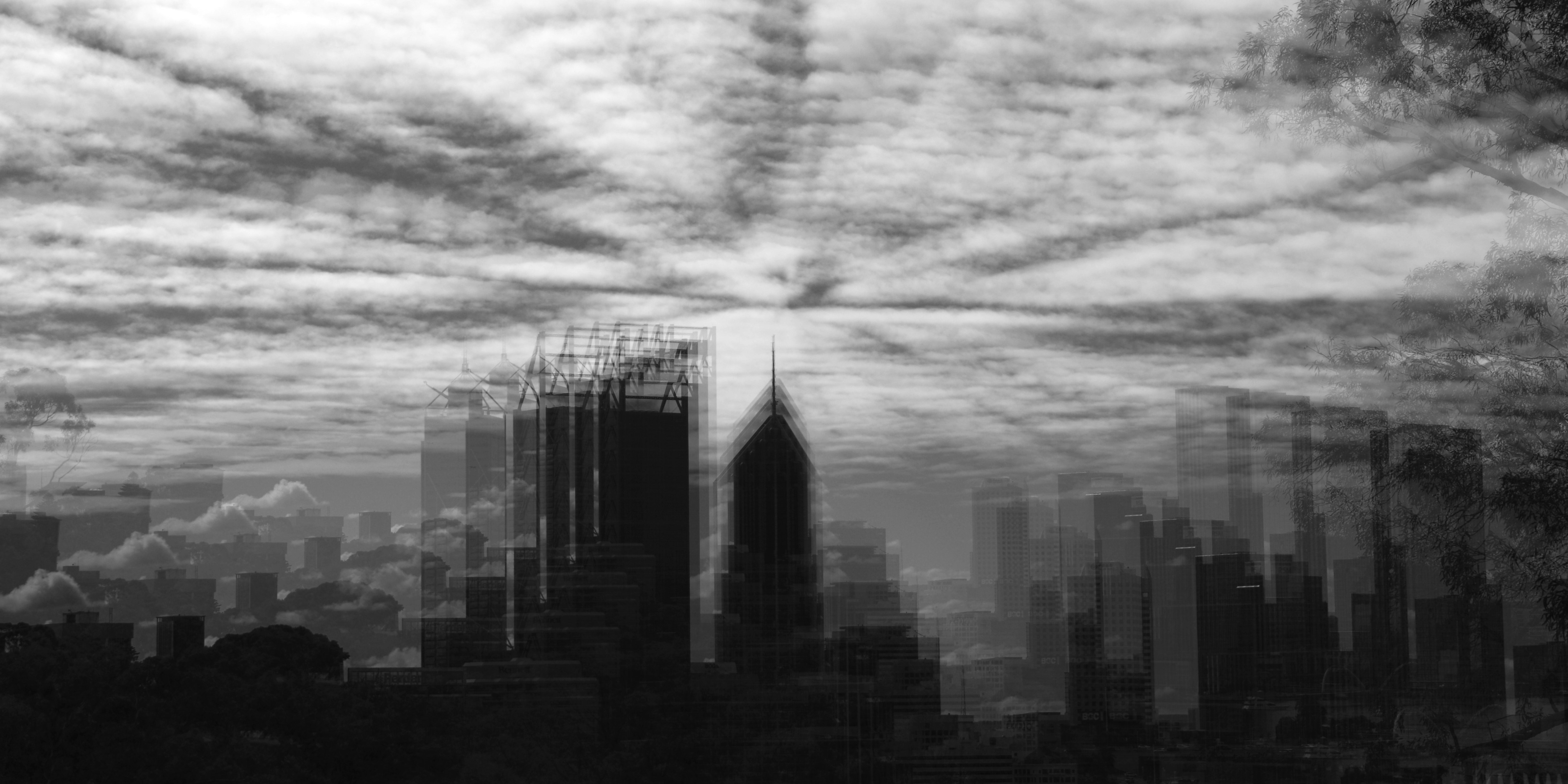 Central Spine Under Striated Skies: A Monochrome Skyline