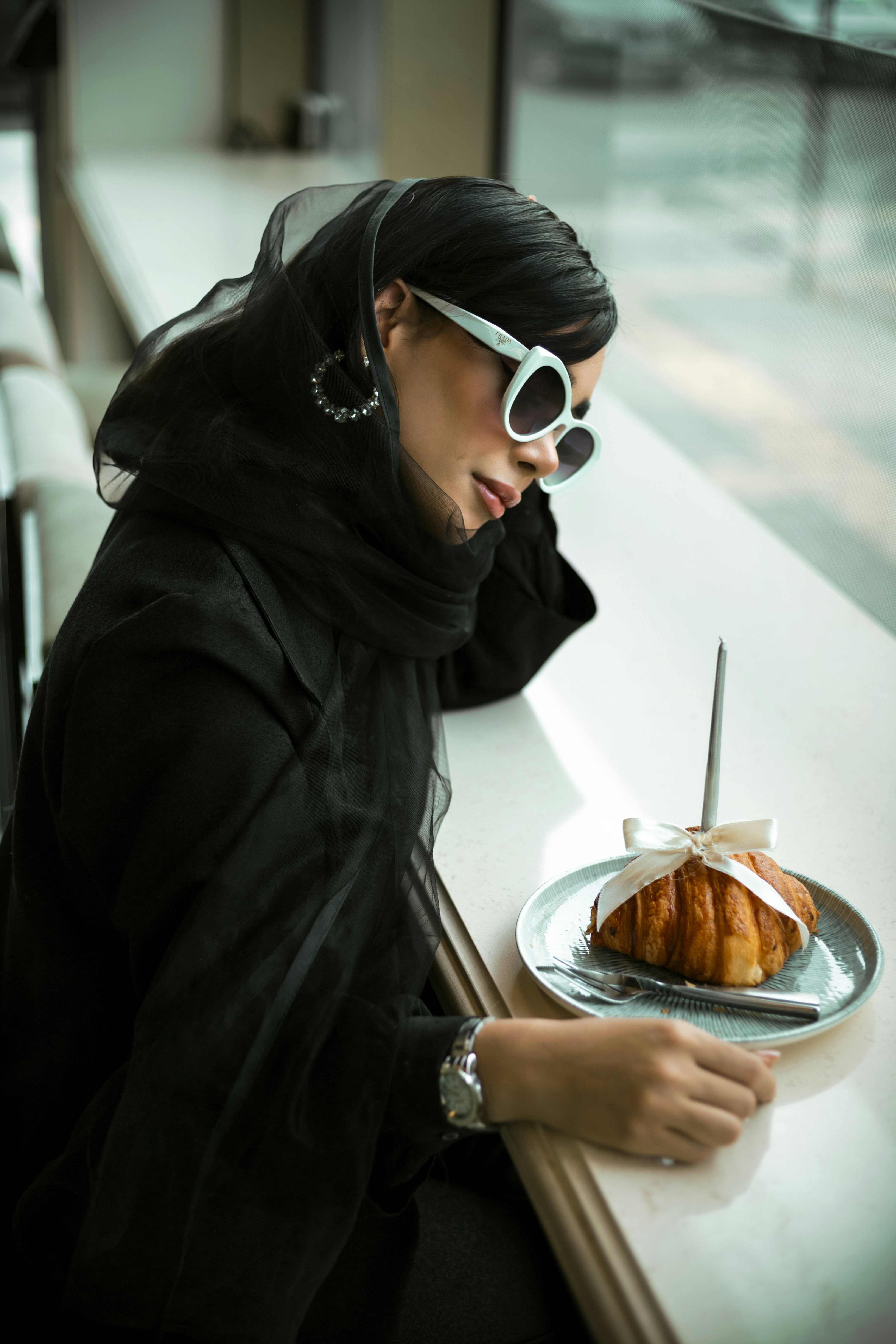 Veil, Glass, and Pastry: A Window-Side Portrait