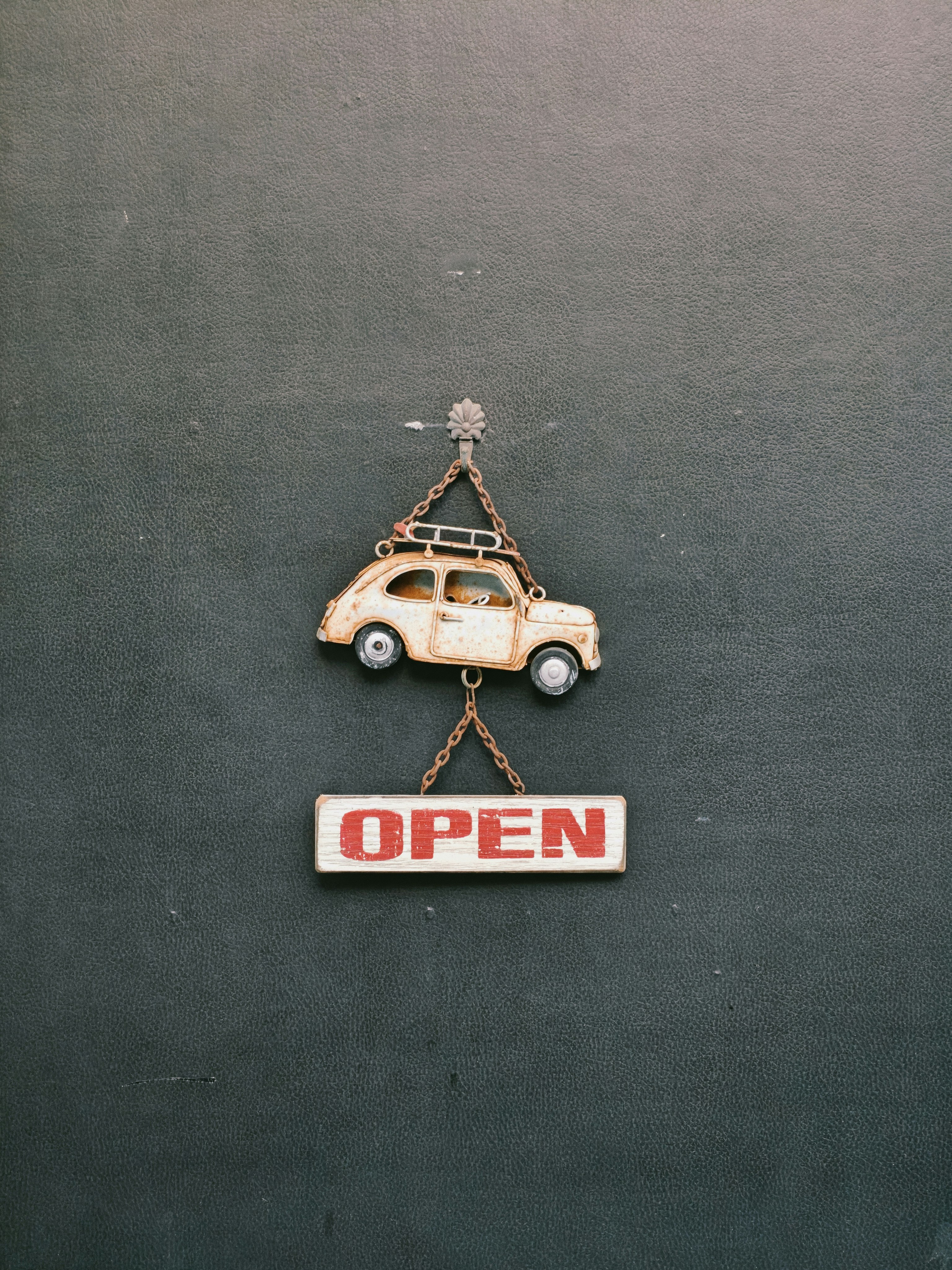 Door accessories. | Small car decoration with open sign hanging