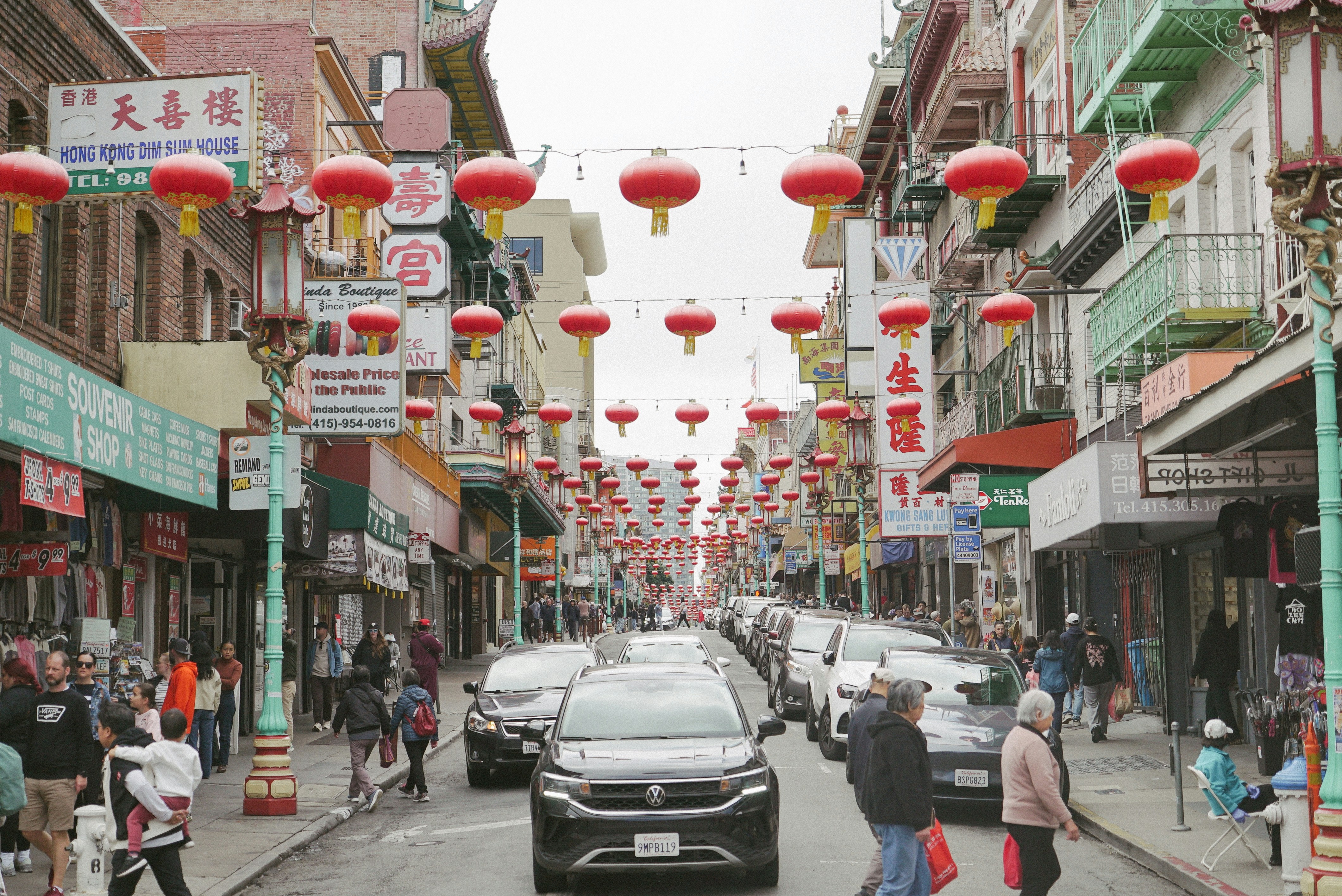 Chinatown San Francisco | Chinatown street decorated with red lanterns and shops.