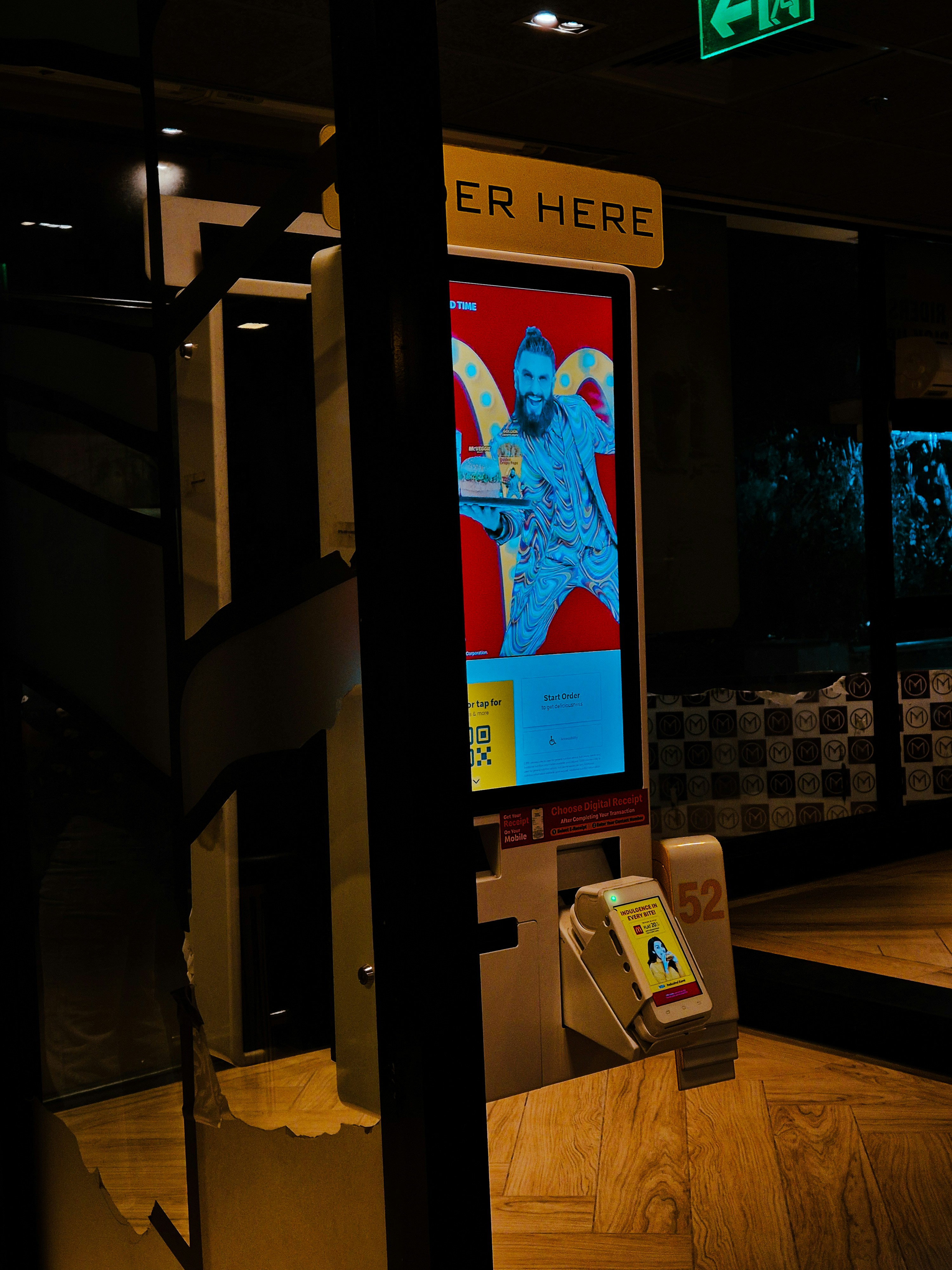Self-order kiosk with a digital menu display