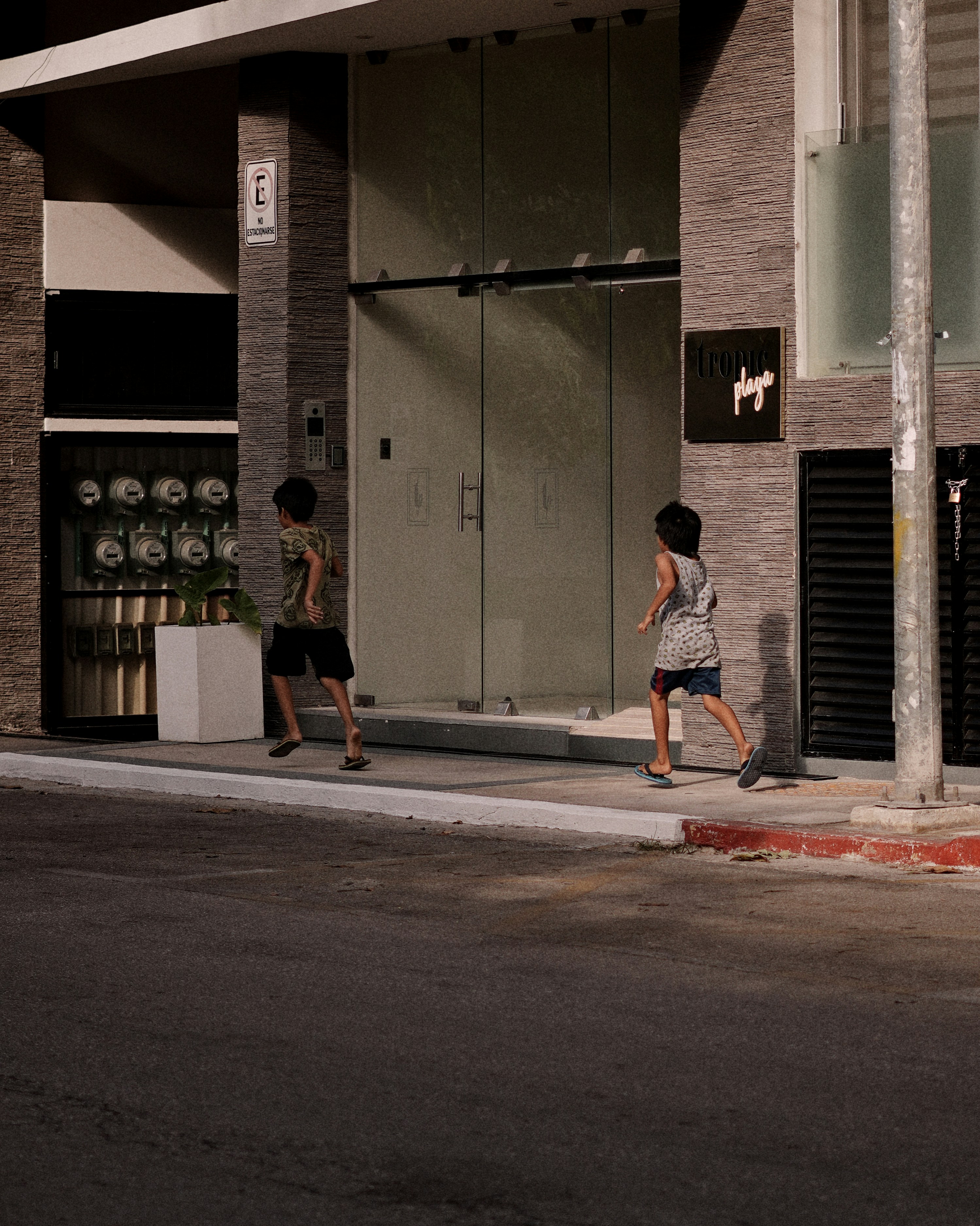 Woman walking on a city street at night