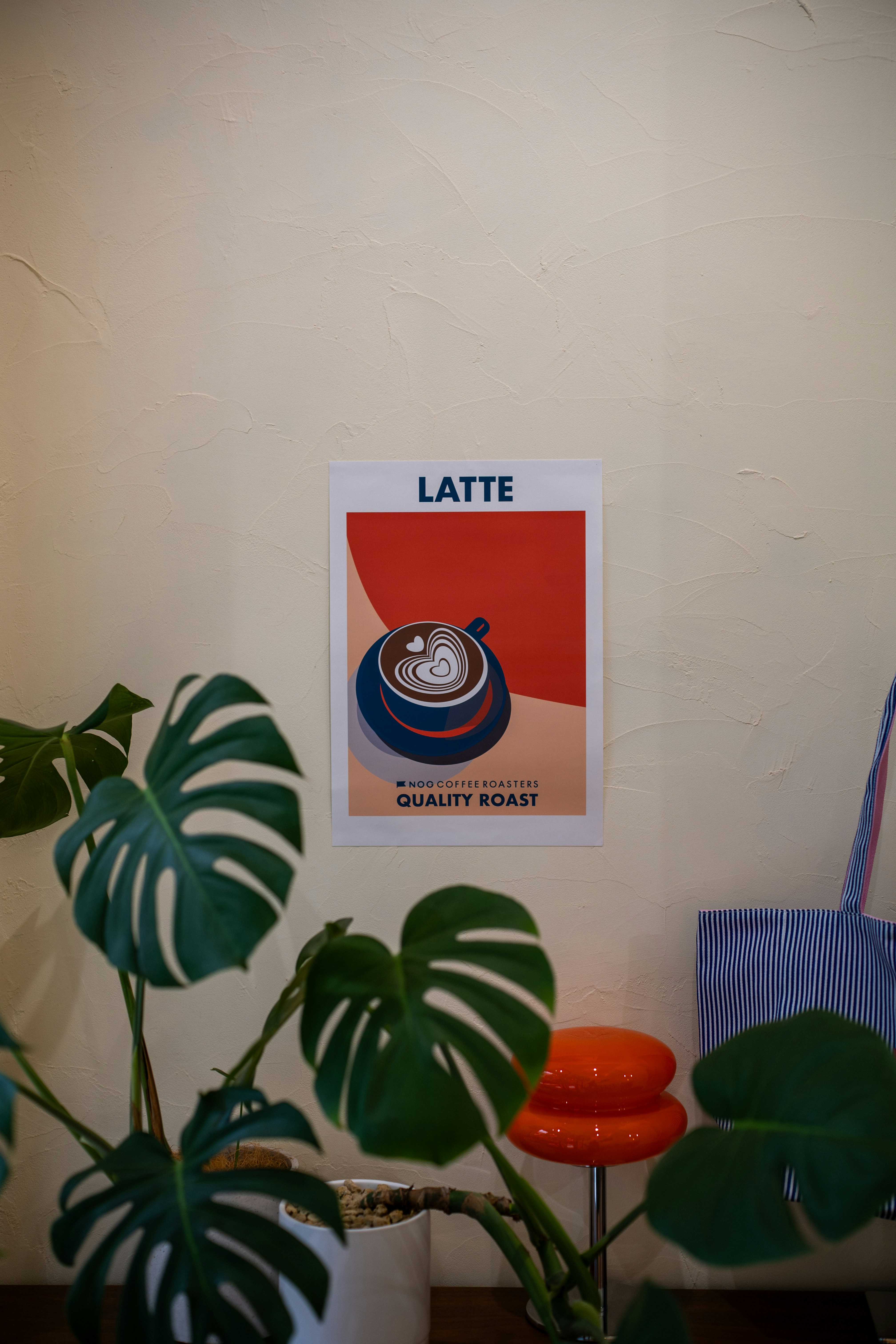 Illustrative poster featuring a latte art design with the text 'LATTE' above it, set against a vibrant background. Ideal for coffee enthusiasts and café decor.