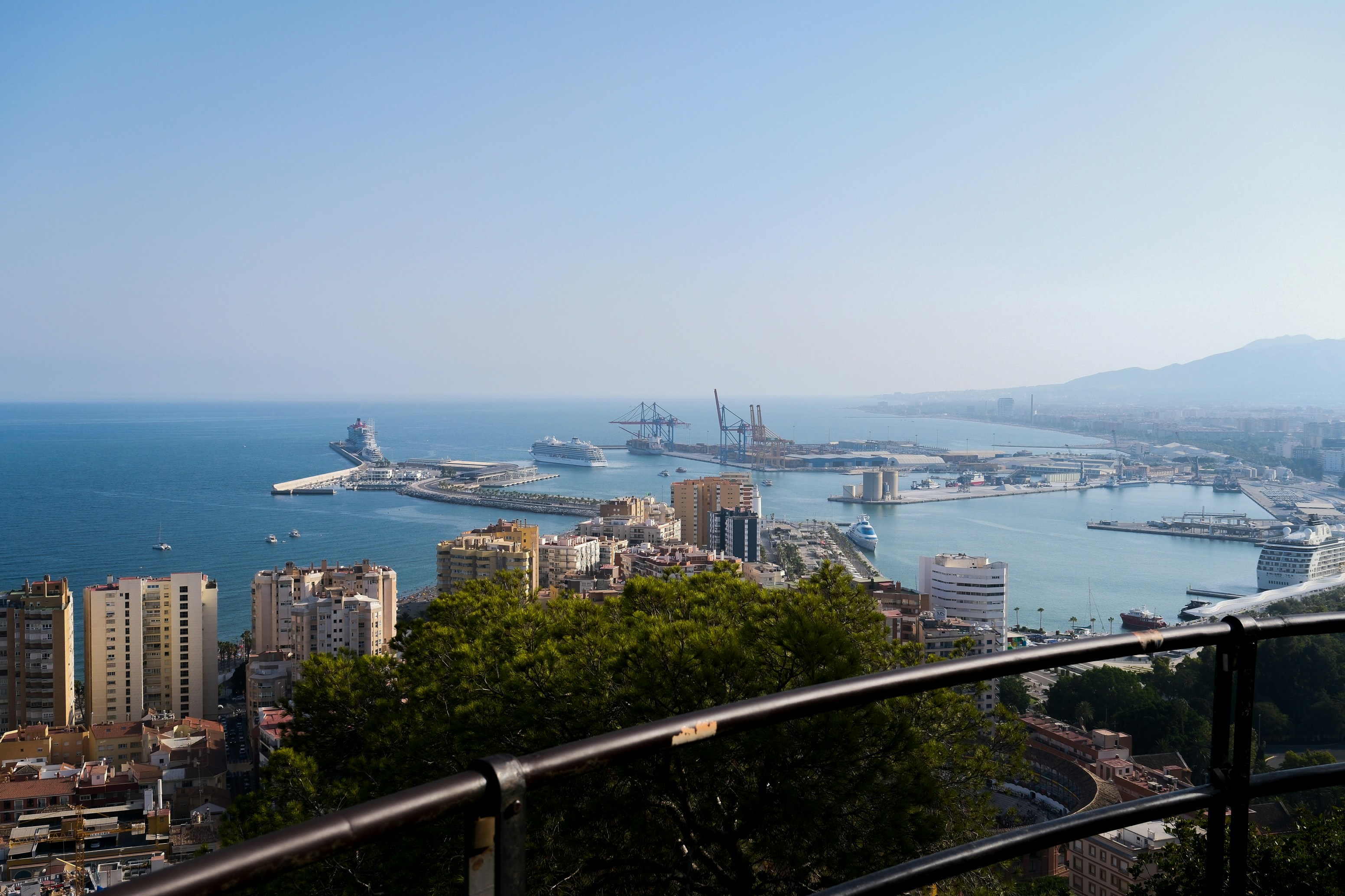 Coastal city with harbor and blue sky