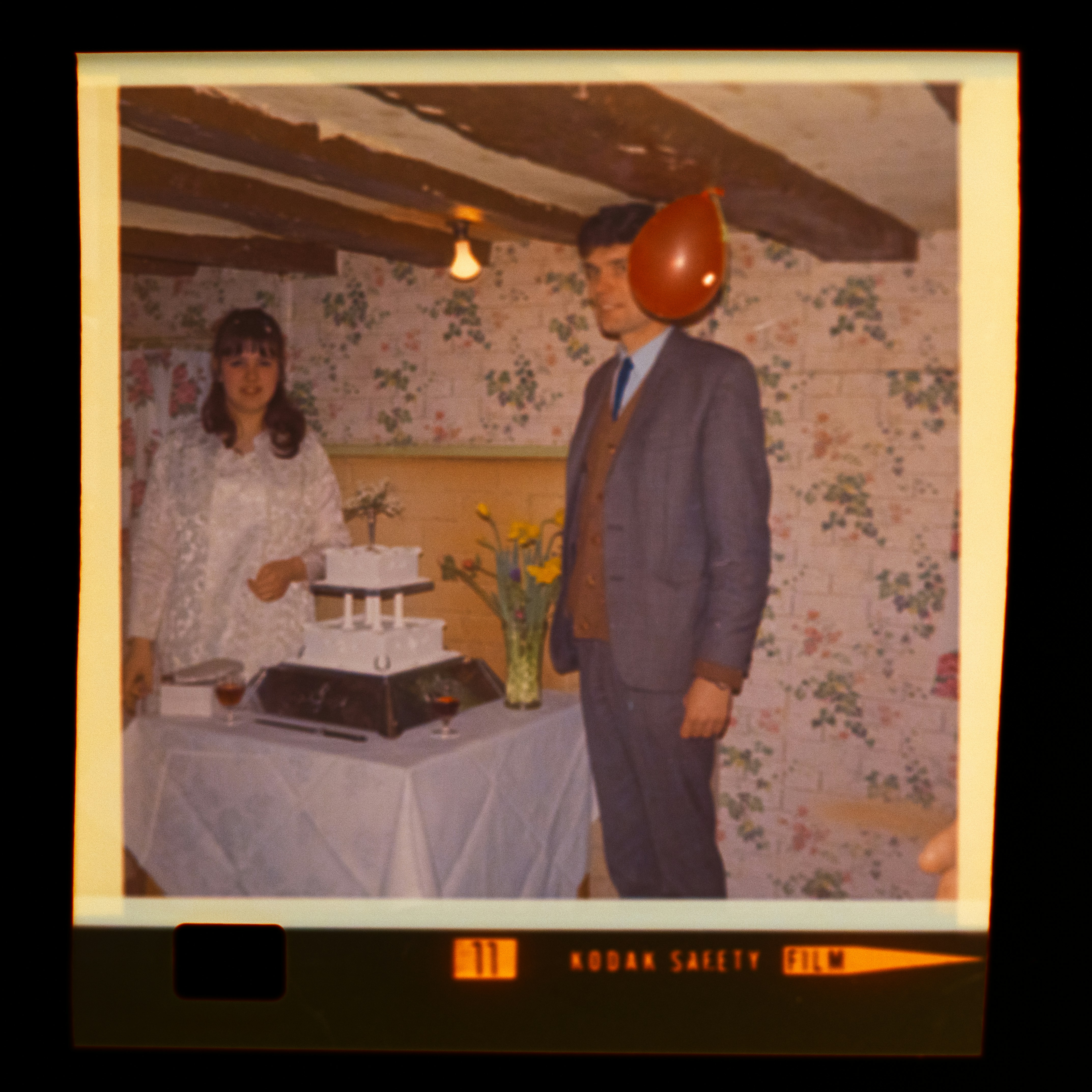 Floral Room Birthday Moment: Cake, Balloons, and a Quiet Pause