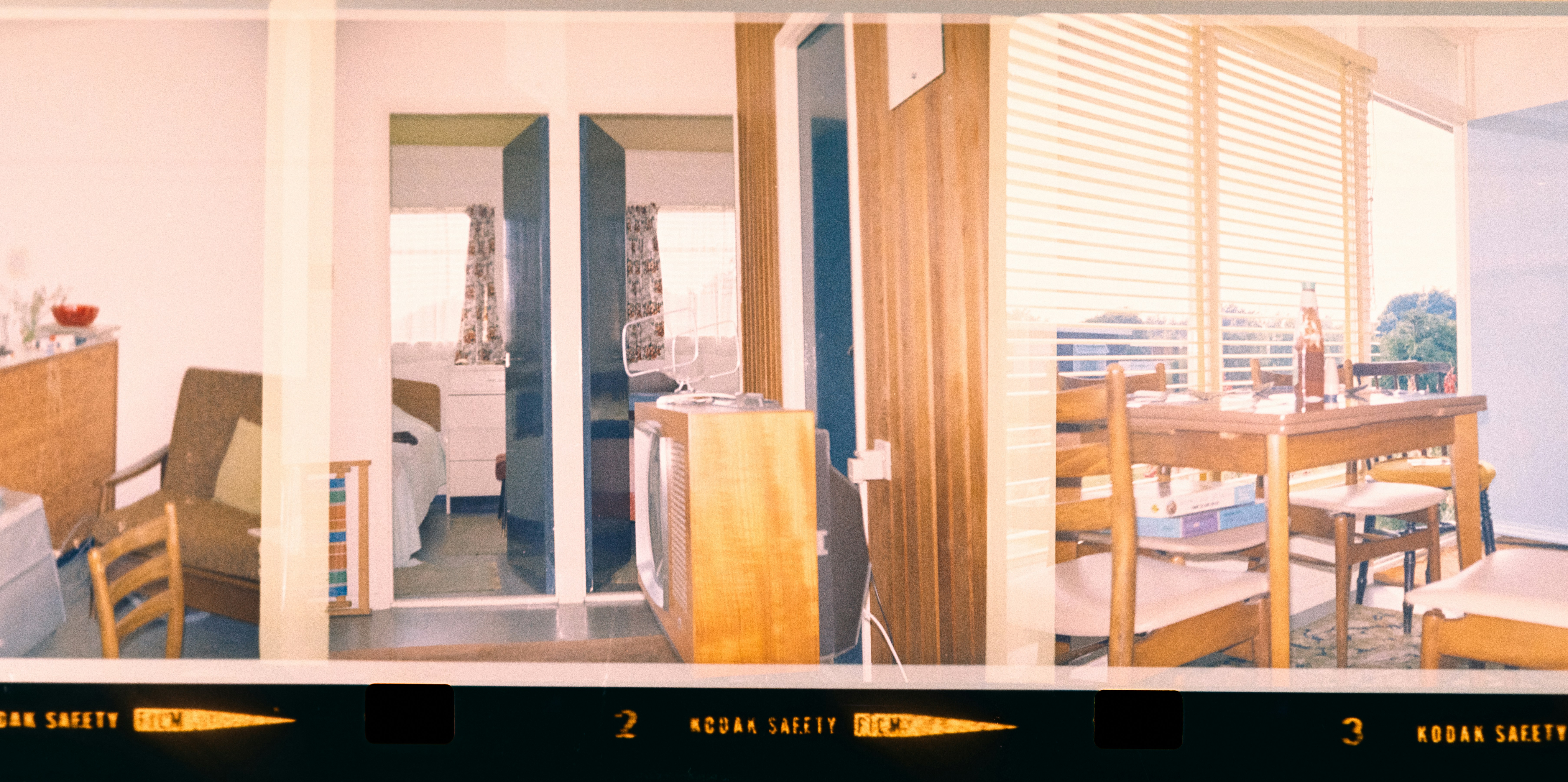 Interior view of a room with furniture and blinds