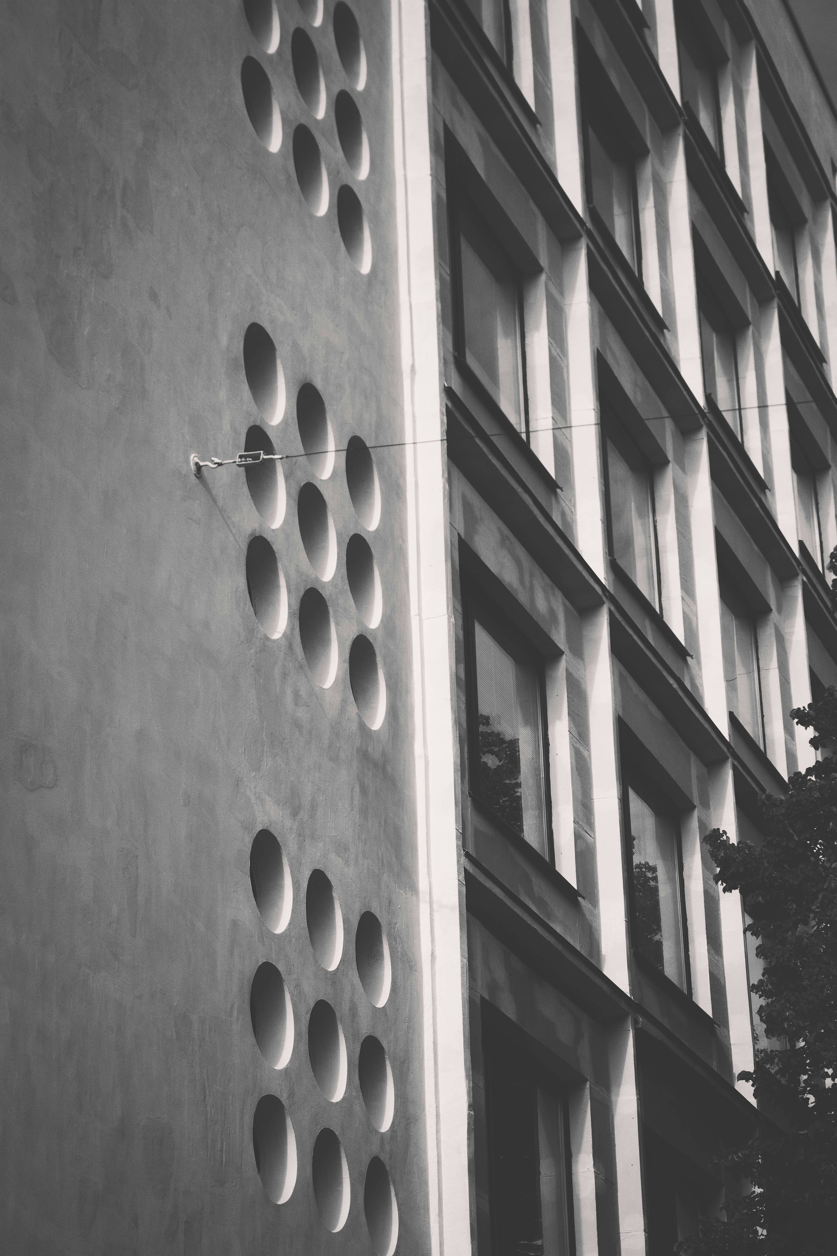 Modern building facade with circular window patterns