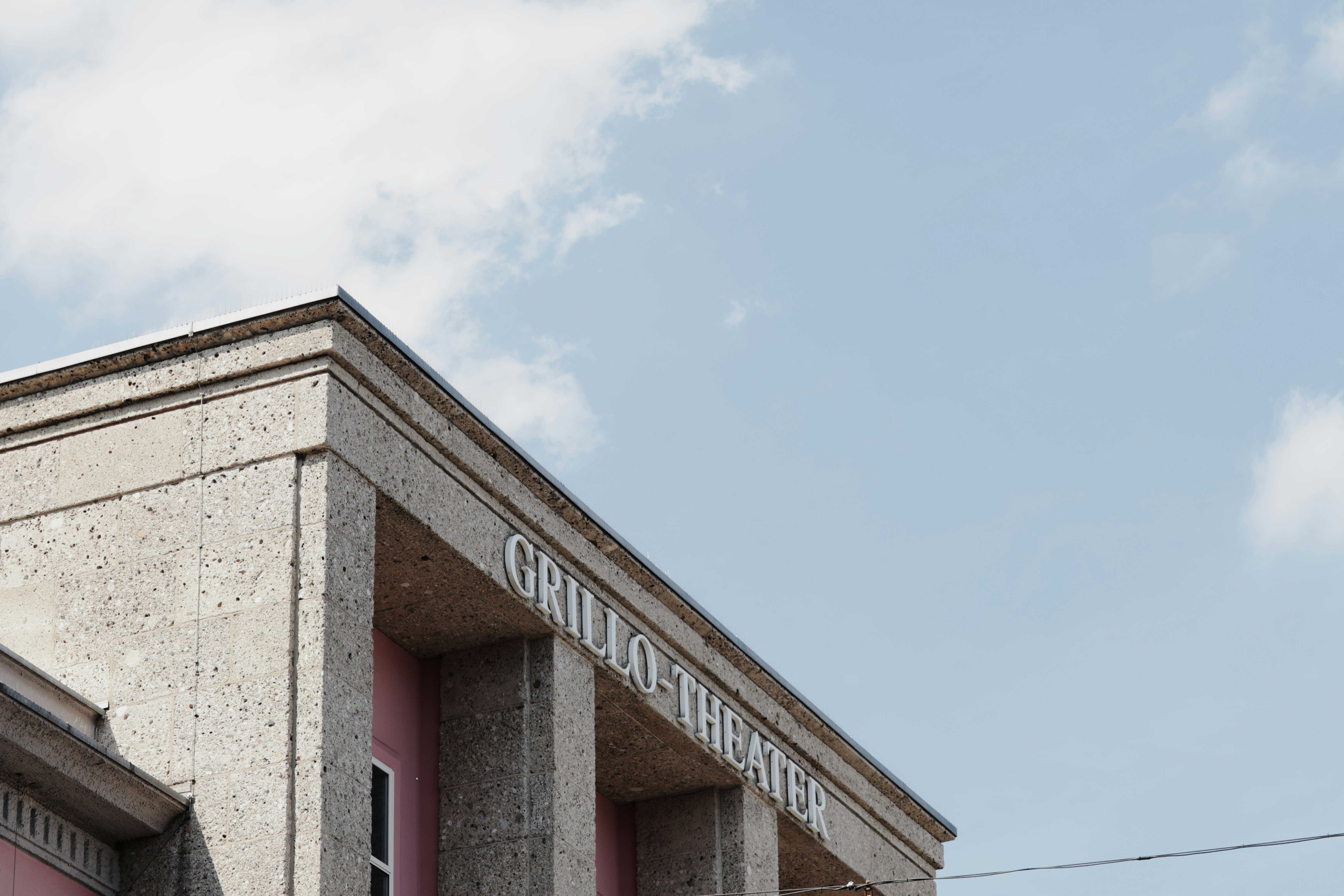 Grillo Theater in Essen, Germany | Grillo-theater building facade against a blue sky