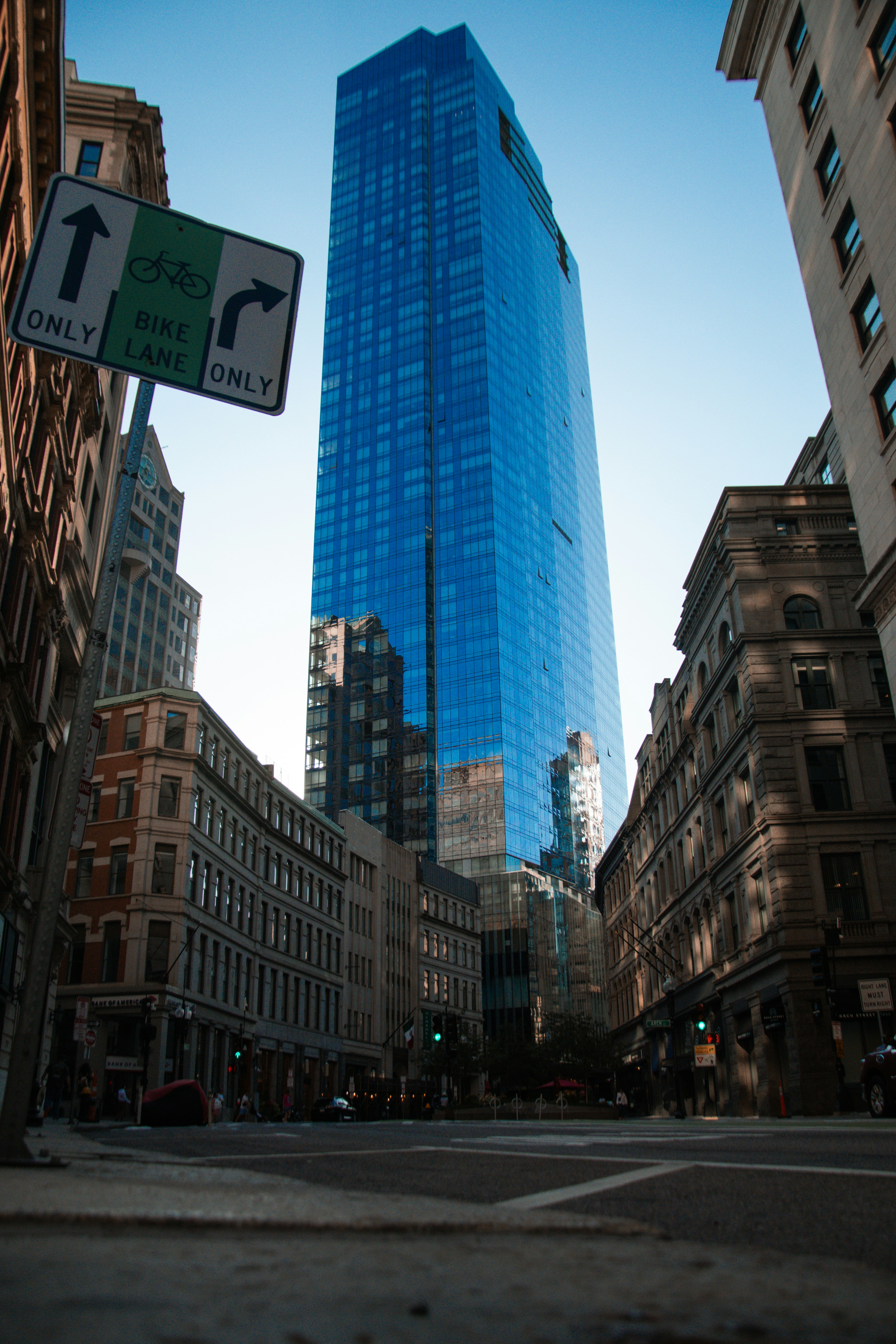 Azure Spire Rising Over a Concrete Canyon