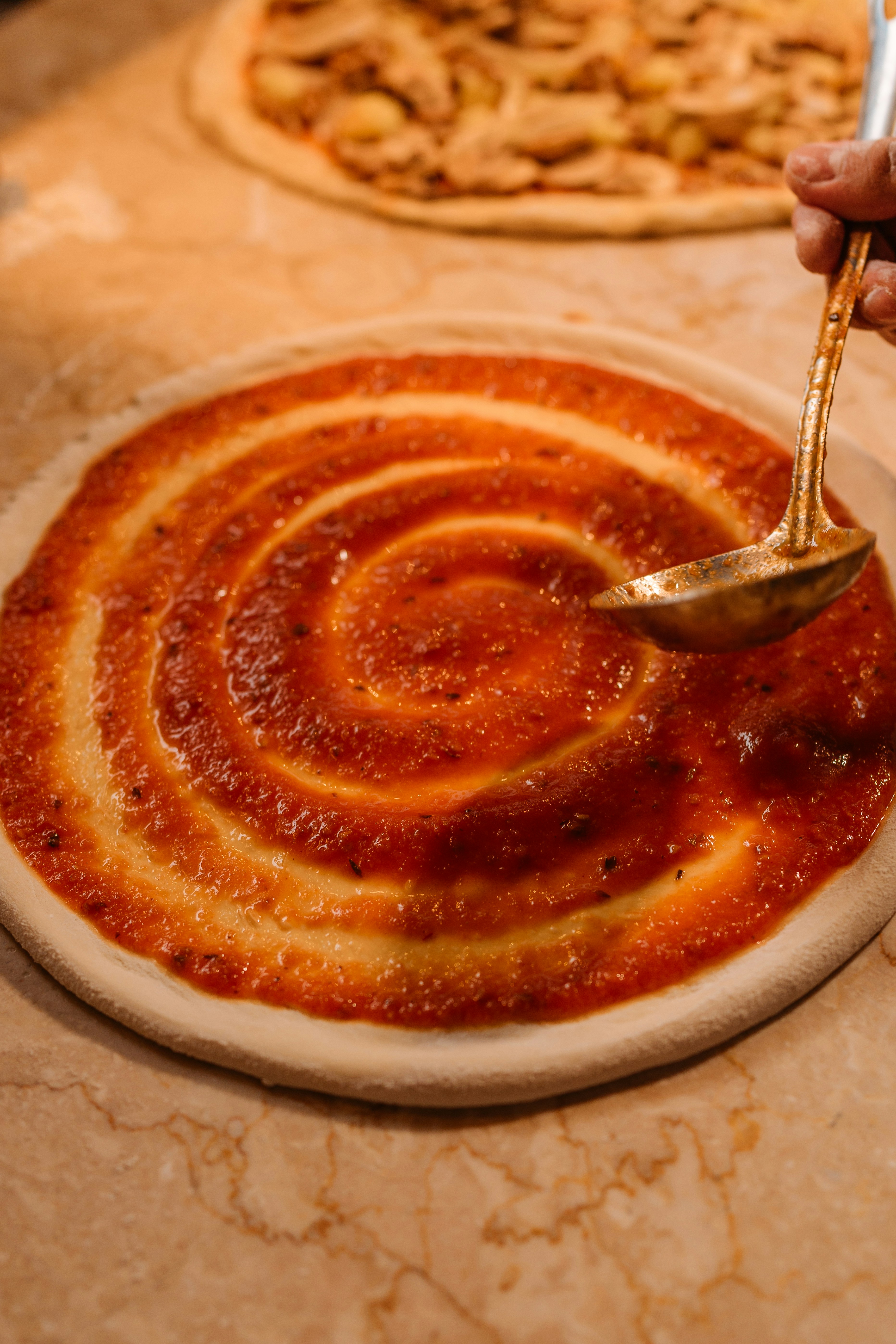 Crafting Culinary Art: The Pizza Sauce Spiral