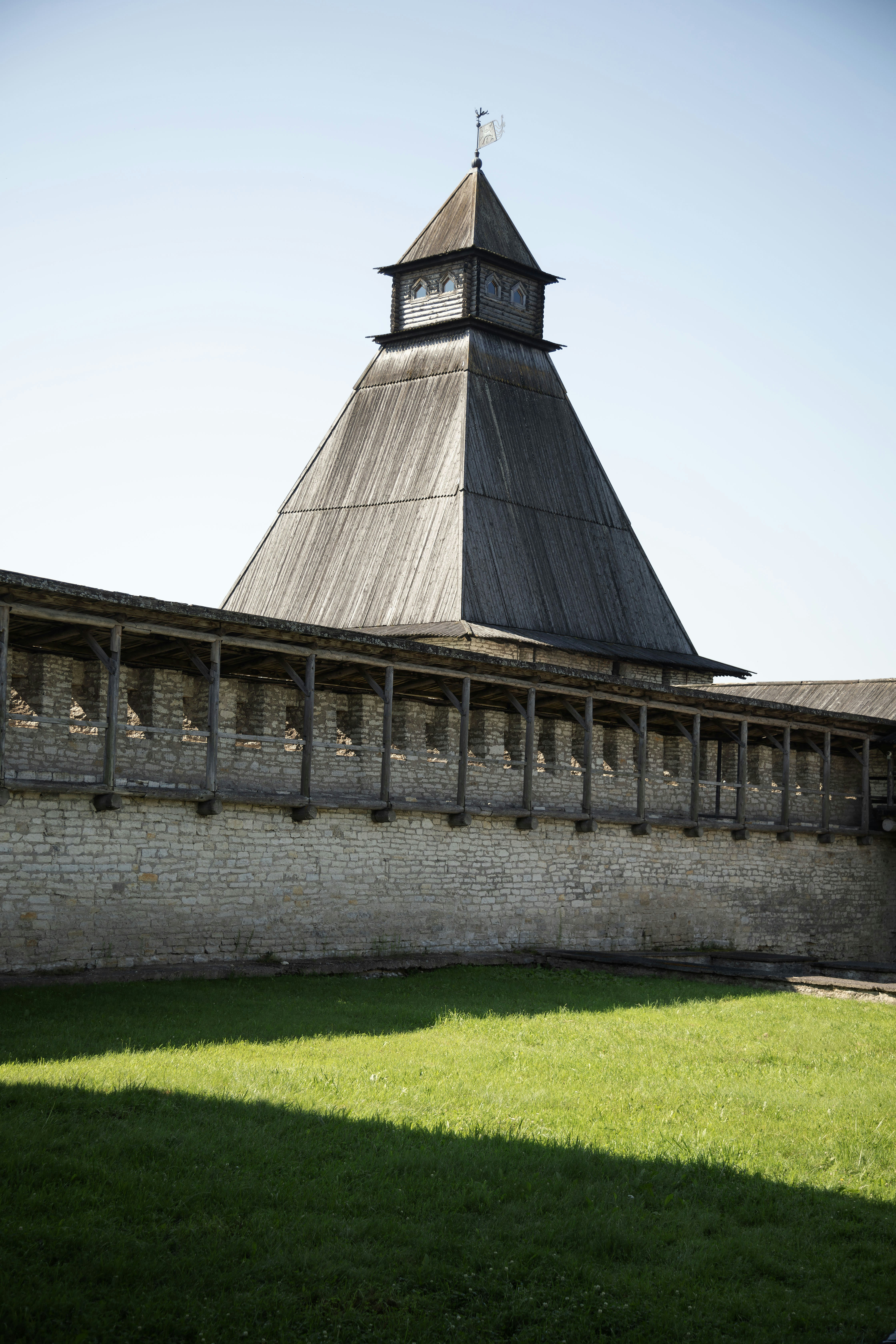 The Timeless Sentinel: A Fortress Tower Under Clear Skies