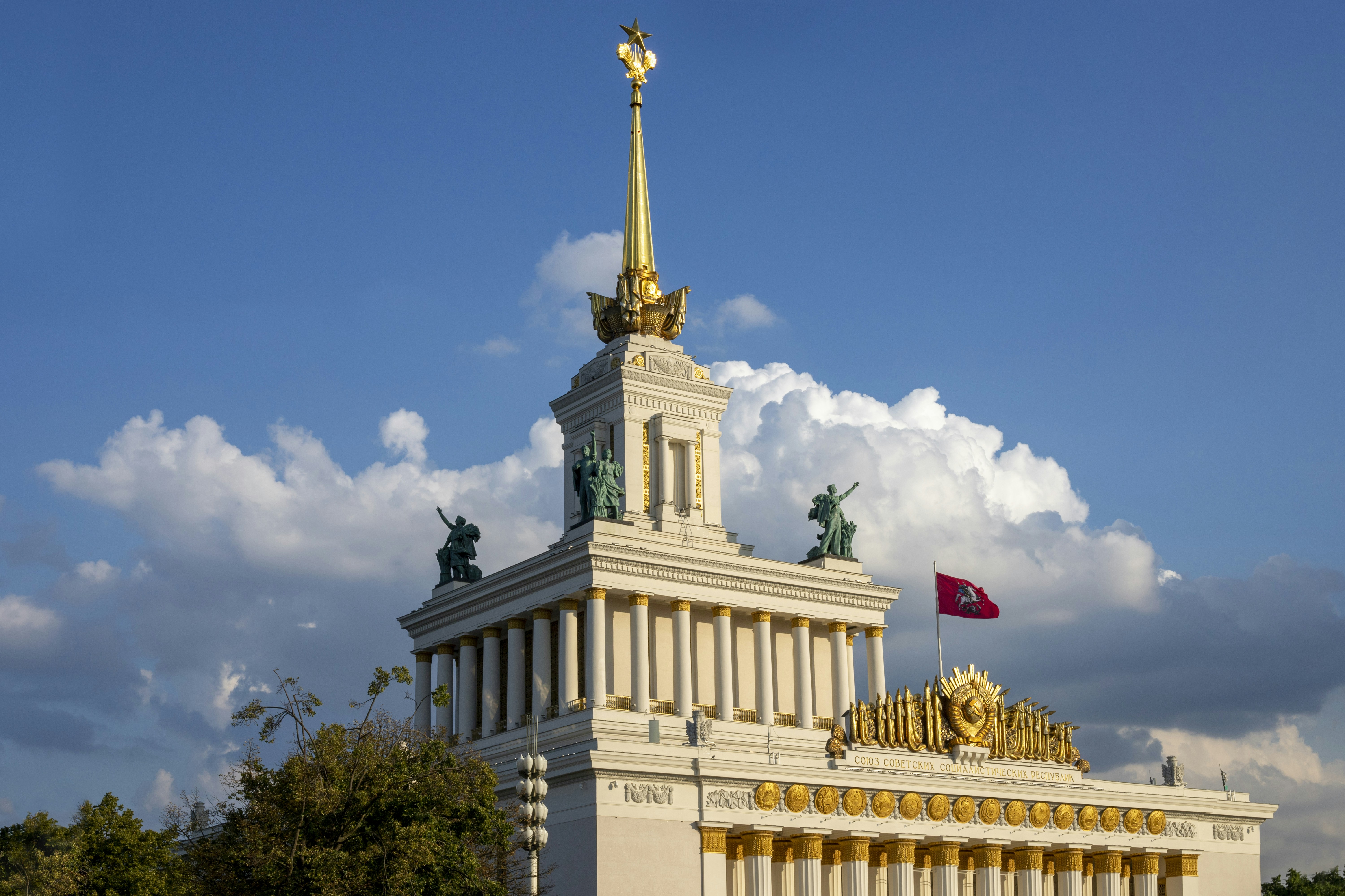 Grand building with spire against blue sky