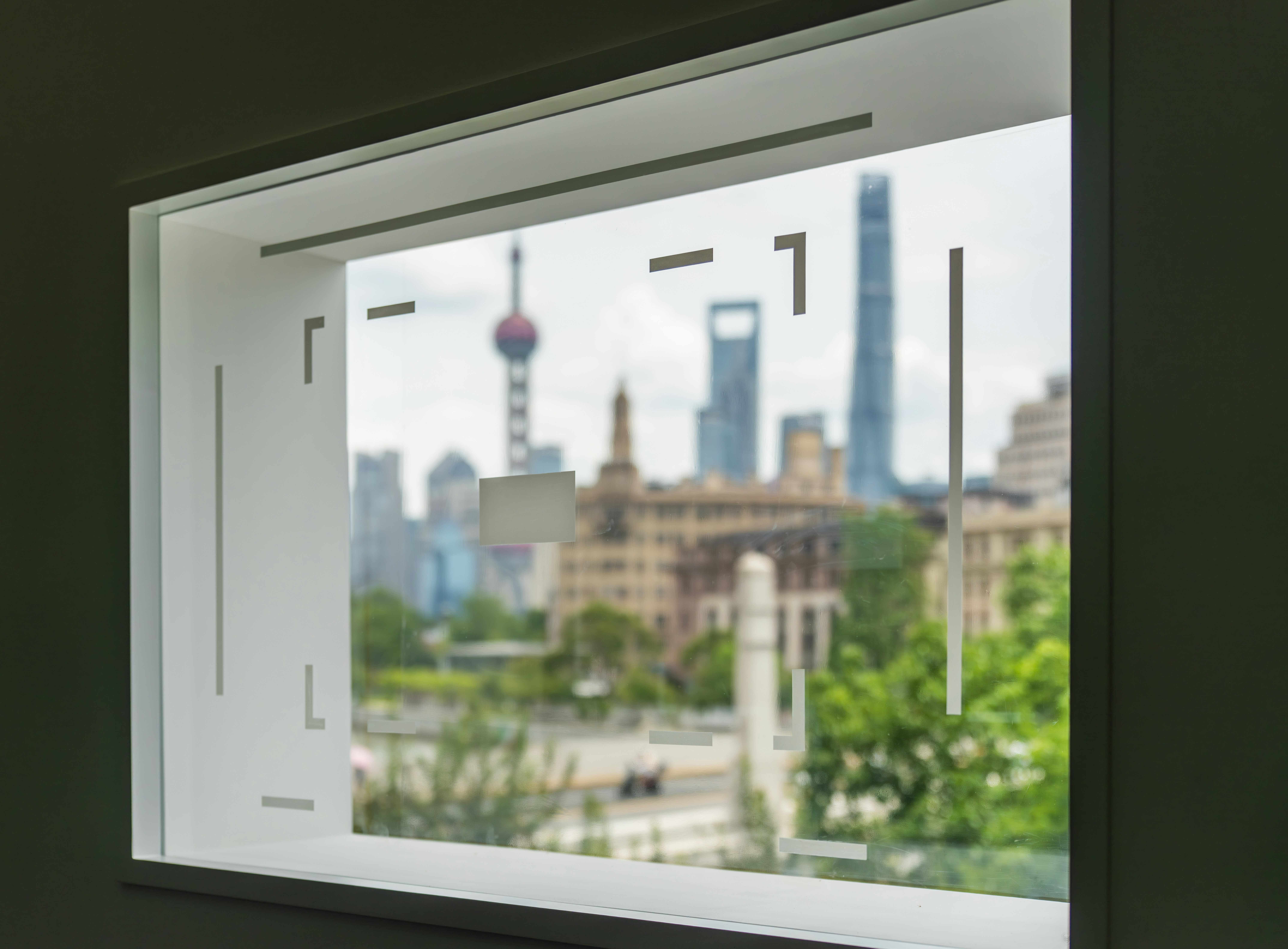 Urban Panorama Through a Minimal Window Frame