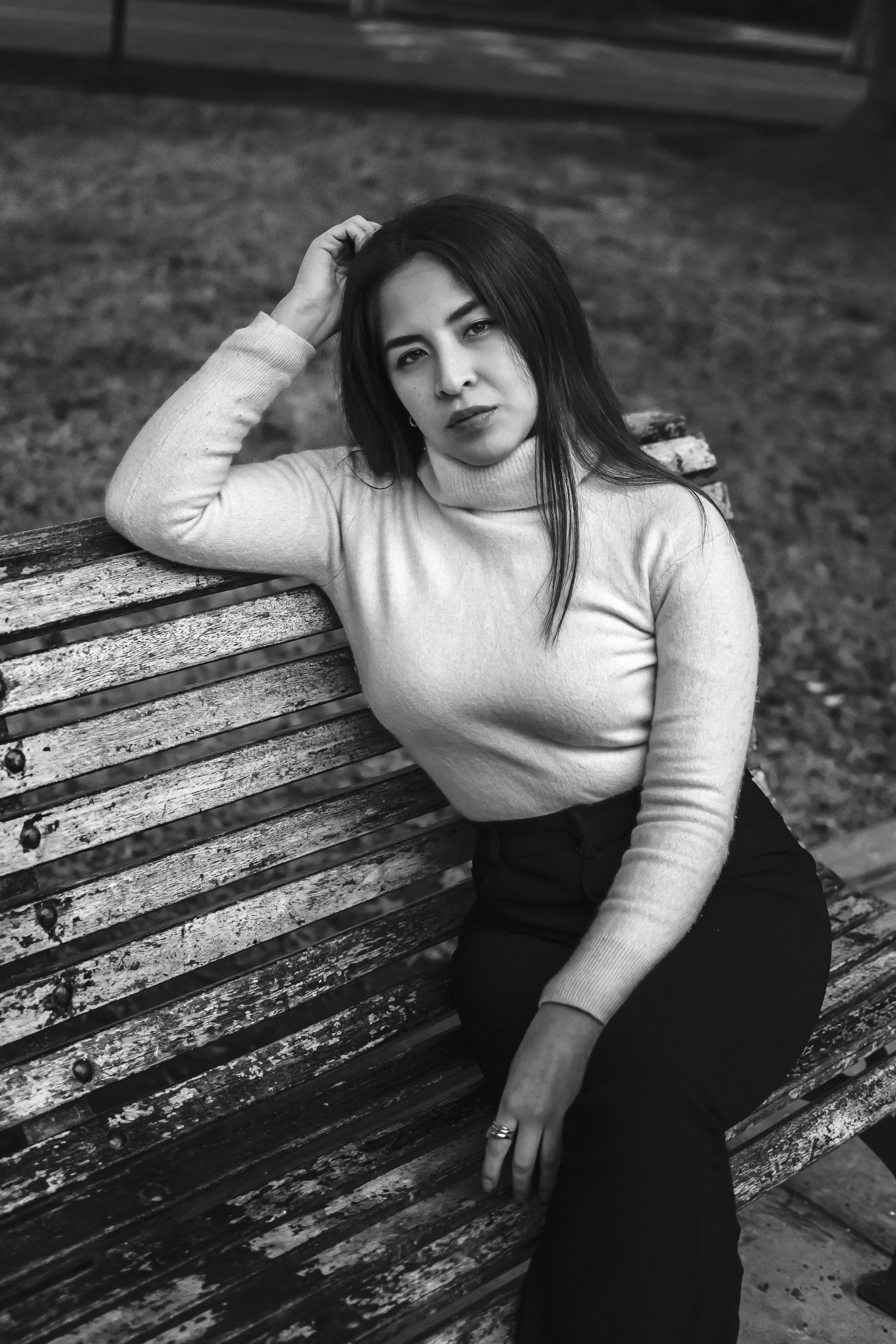 Quiet Confidence on a Weathered Bench
