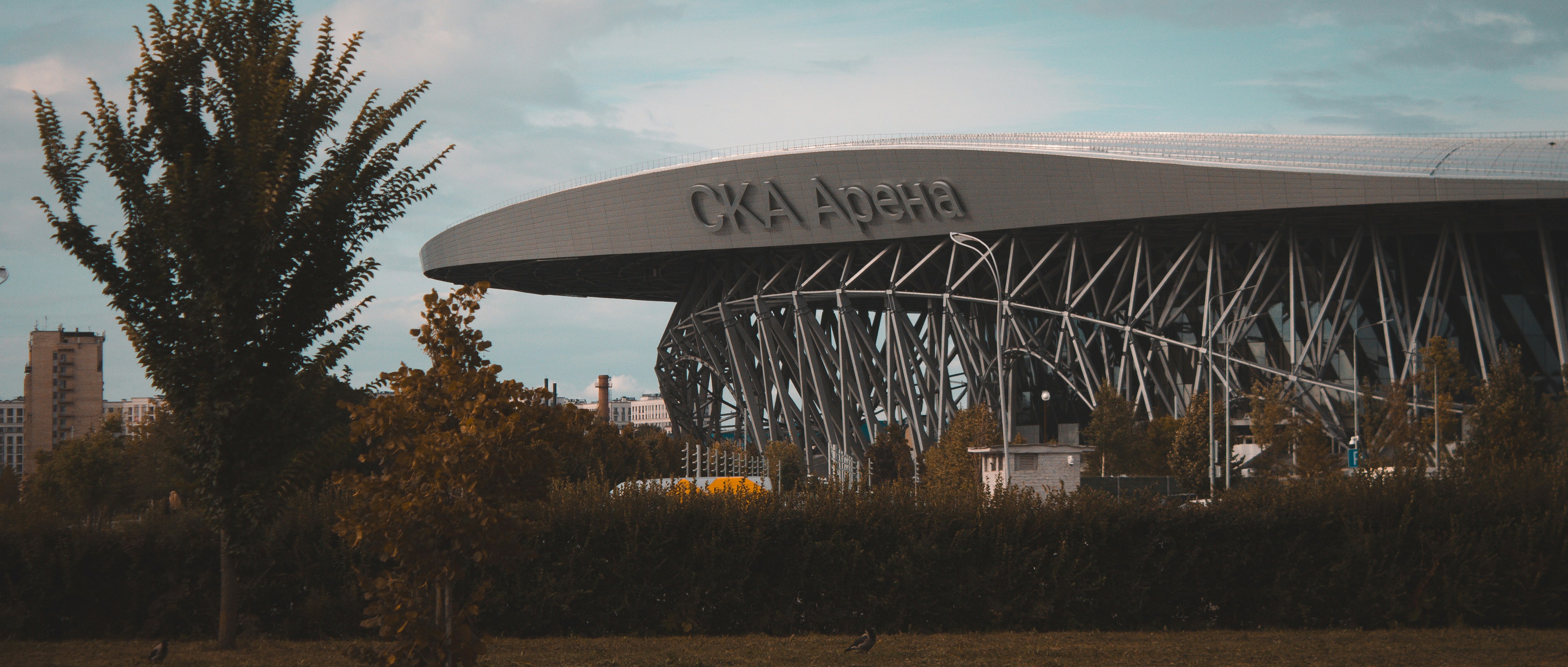 Modern building with glass facade and curved roof