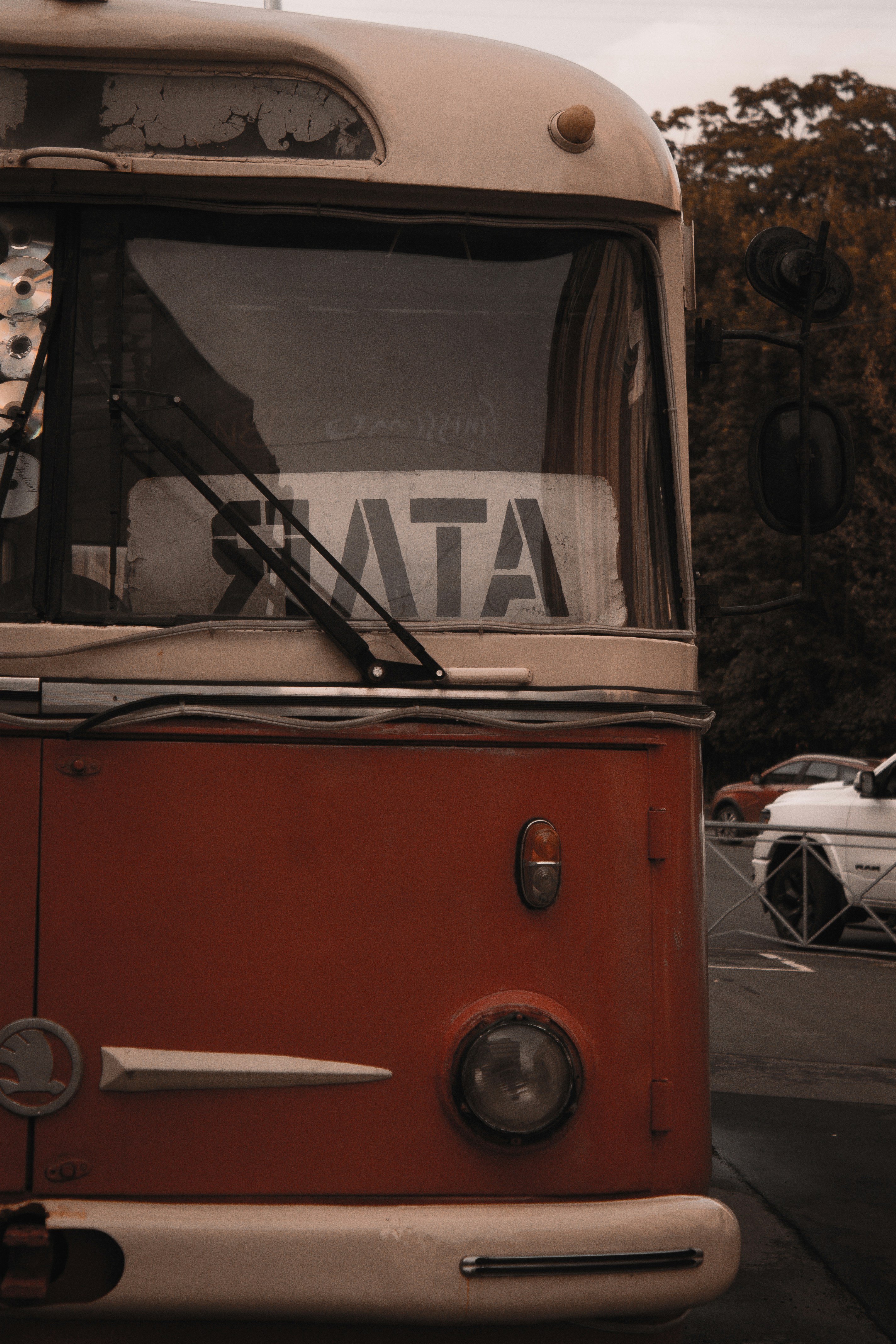 Amber Omega: A Vintage Bus Stares Back