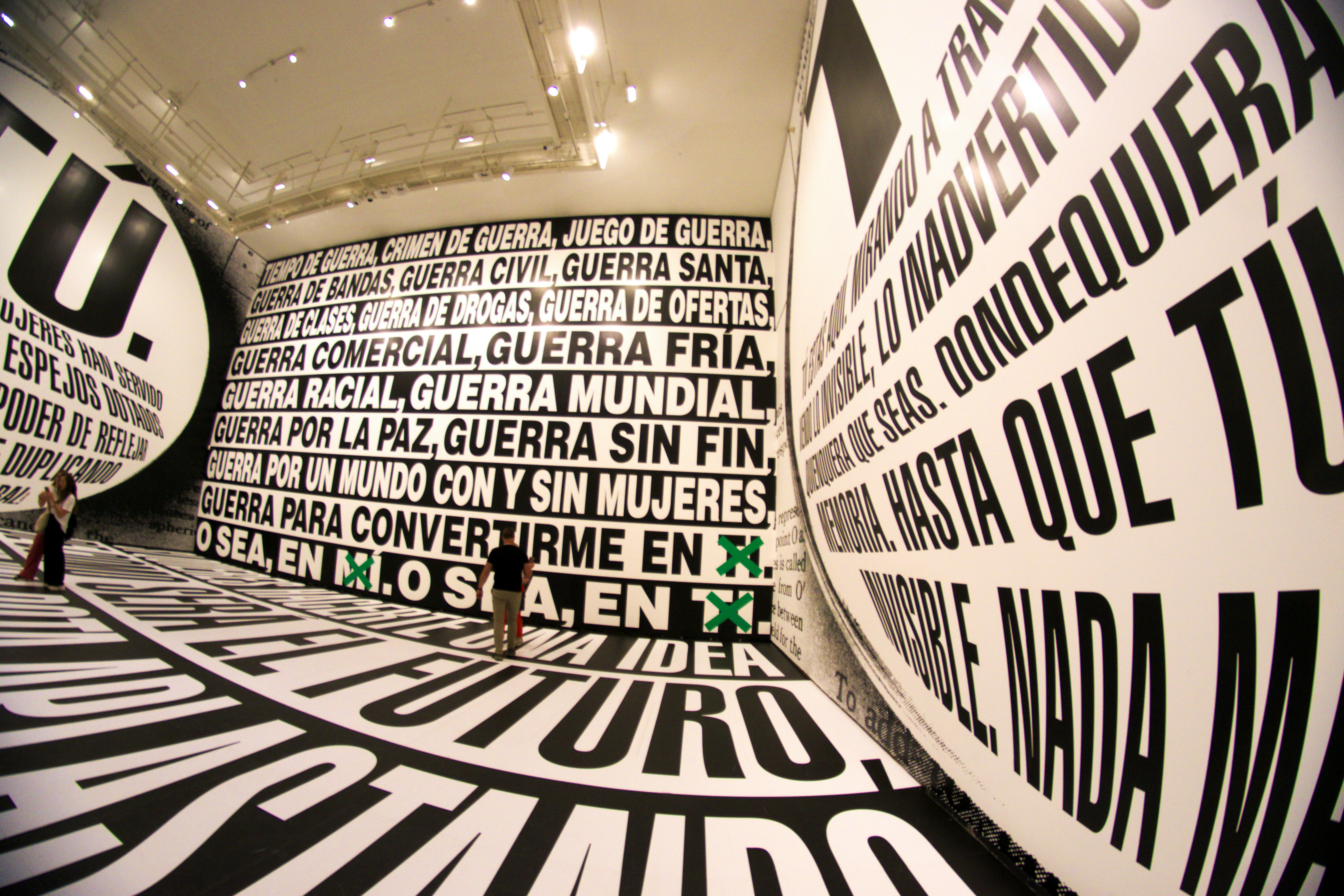 Barbara Kruger is modern artist. In these days there is an exhibition called -Another day, another night- in the Guggeheim Museum of Bilbao | Walls covered in large black text and lettering