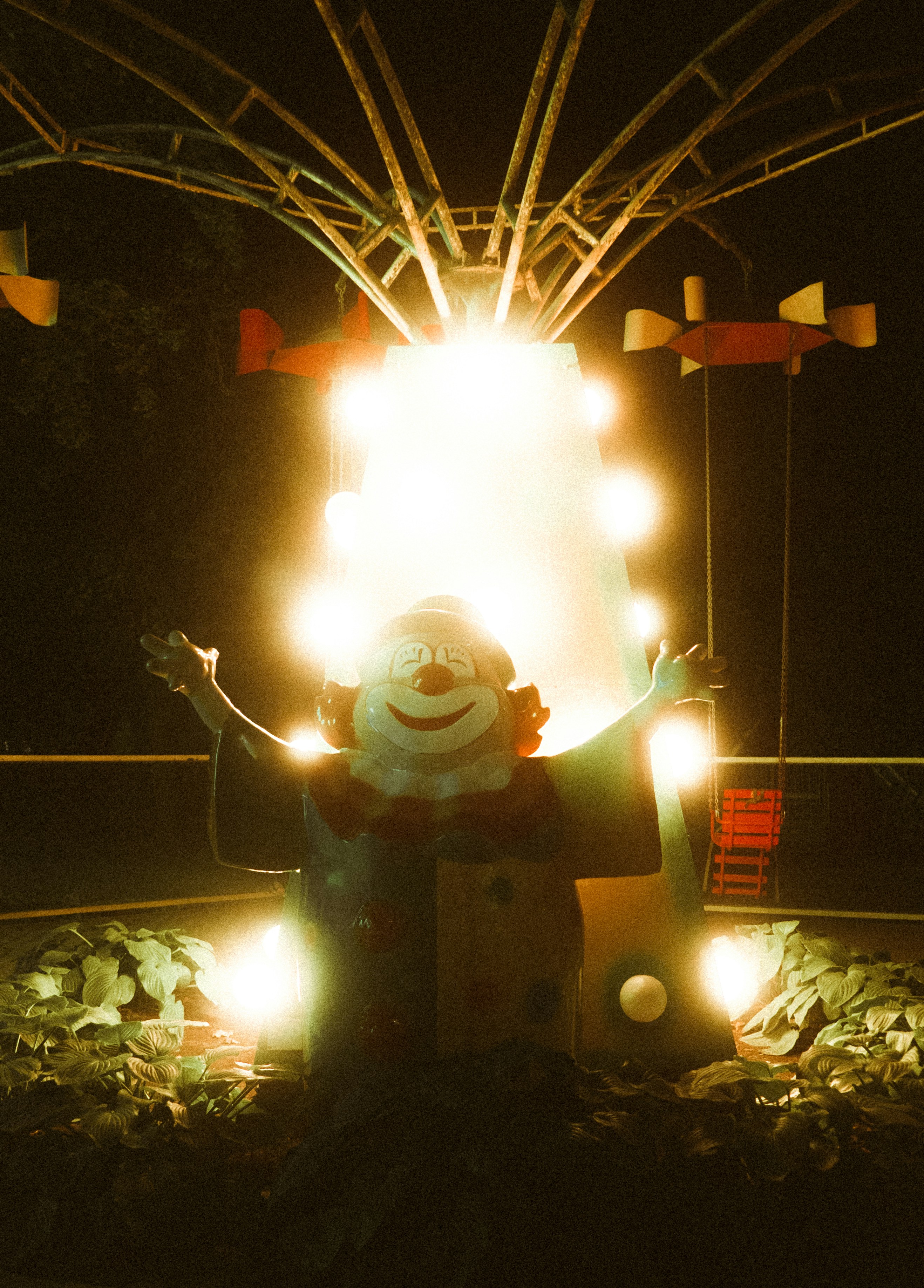 Illuminated Joy: A Clown's Embrace