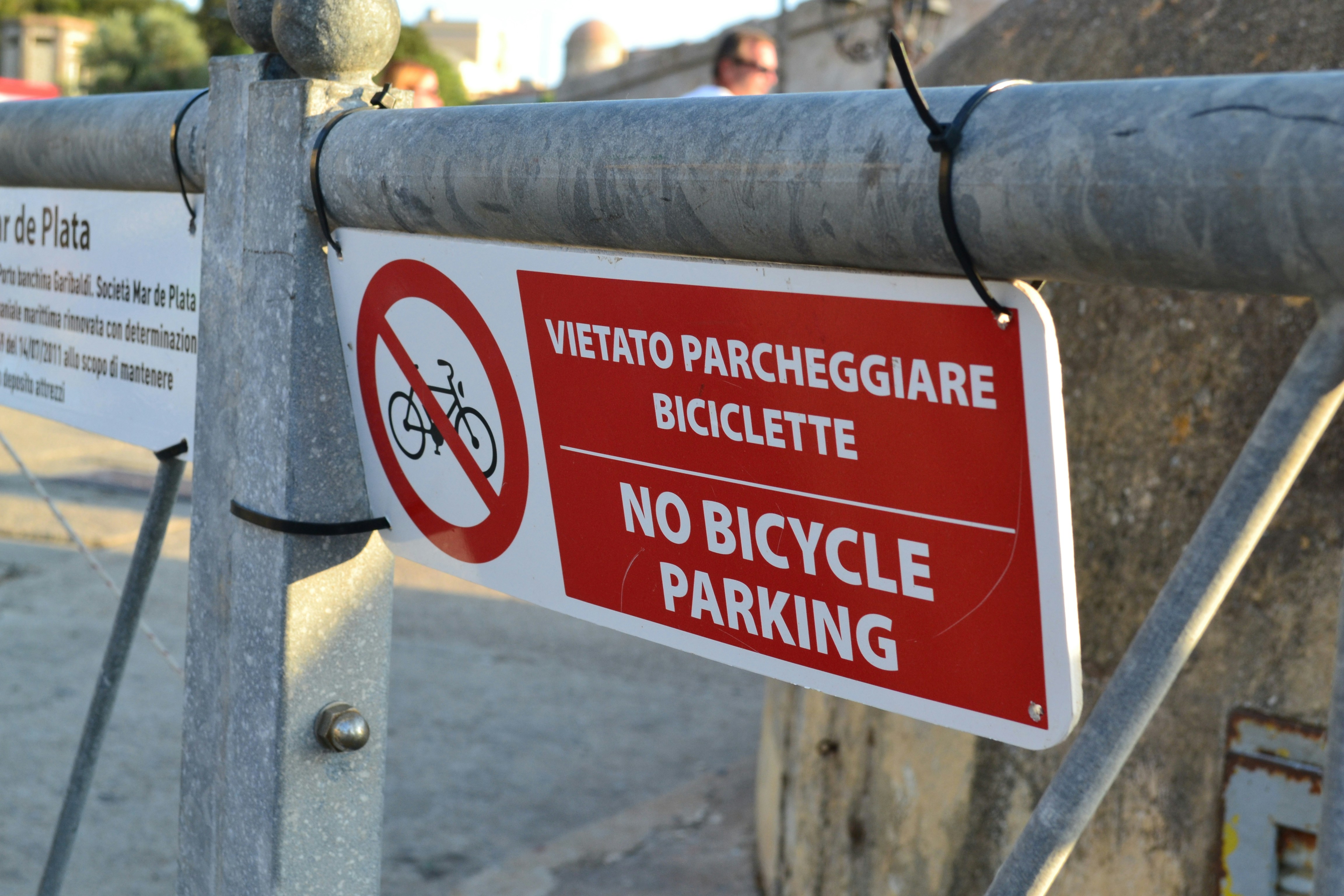 No bicycle parking sign on metal gate