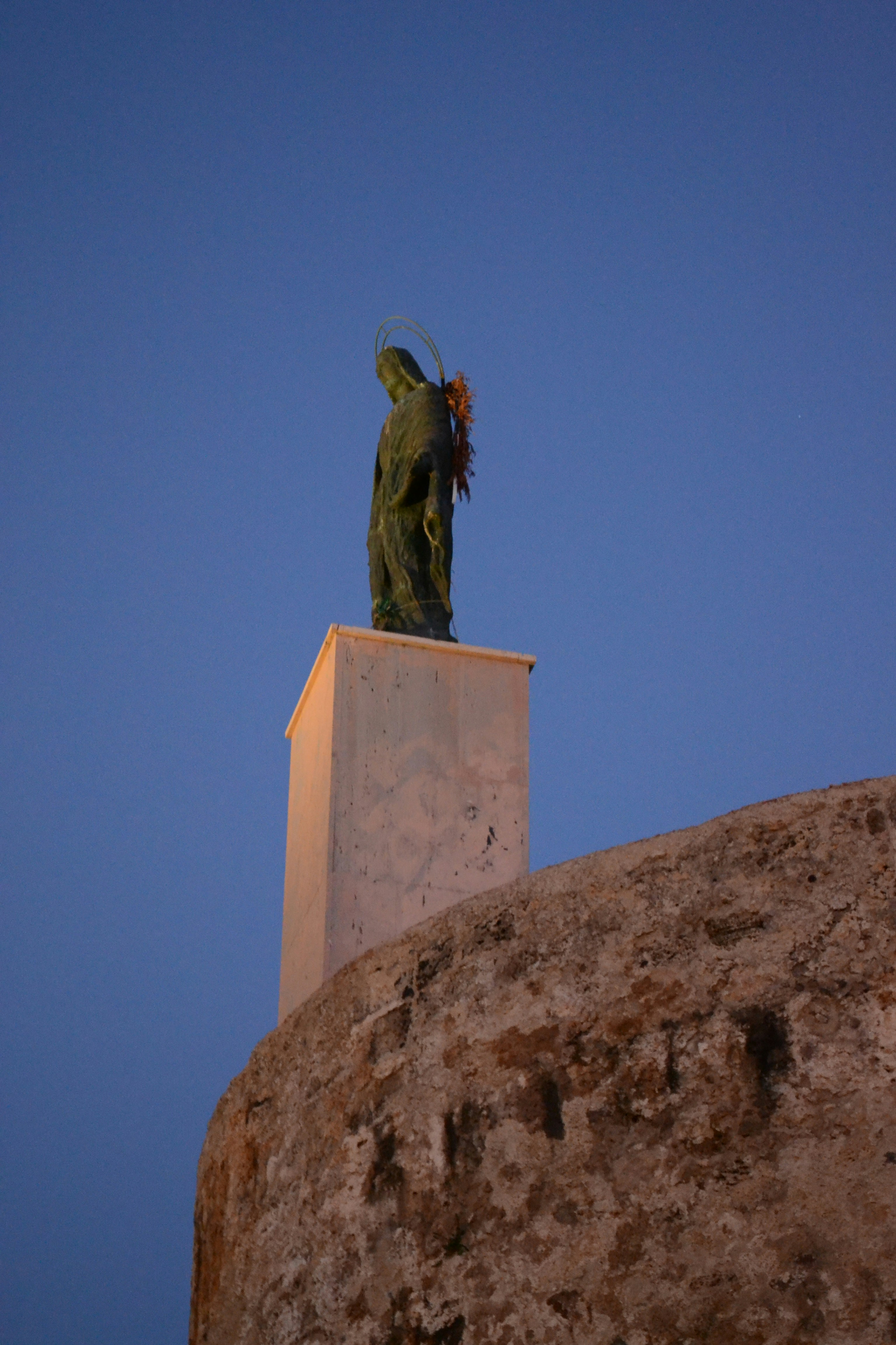 Guardian of the Heights: A Serene Sentinel at Dusk