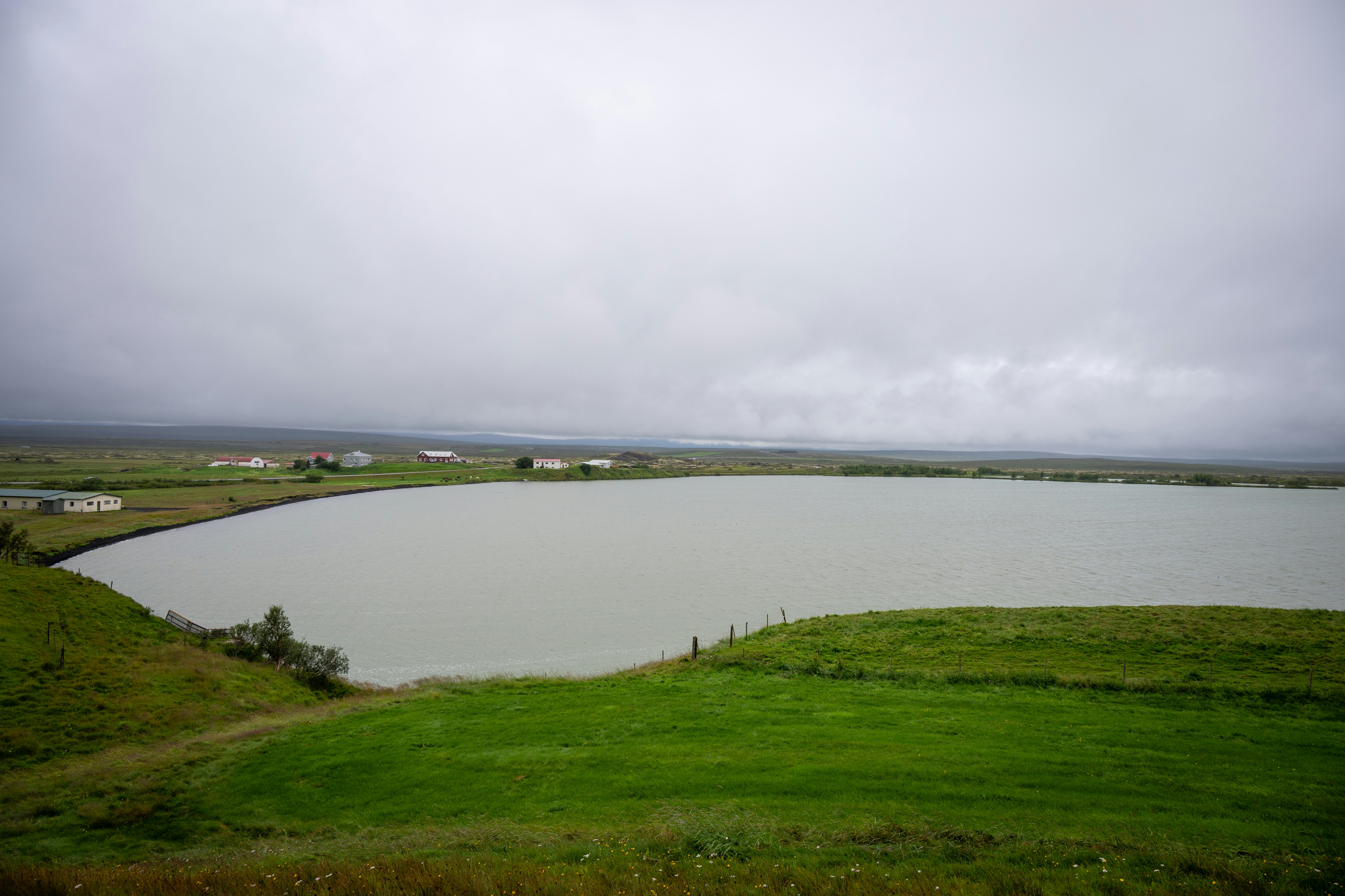 Serene Waterscape Under Overcast Skies