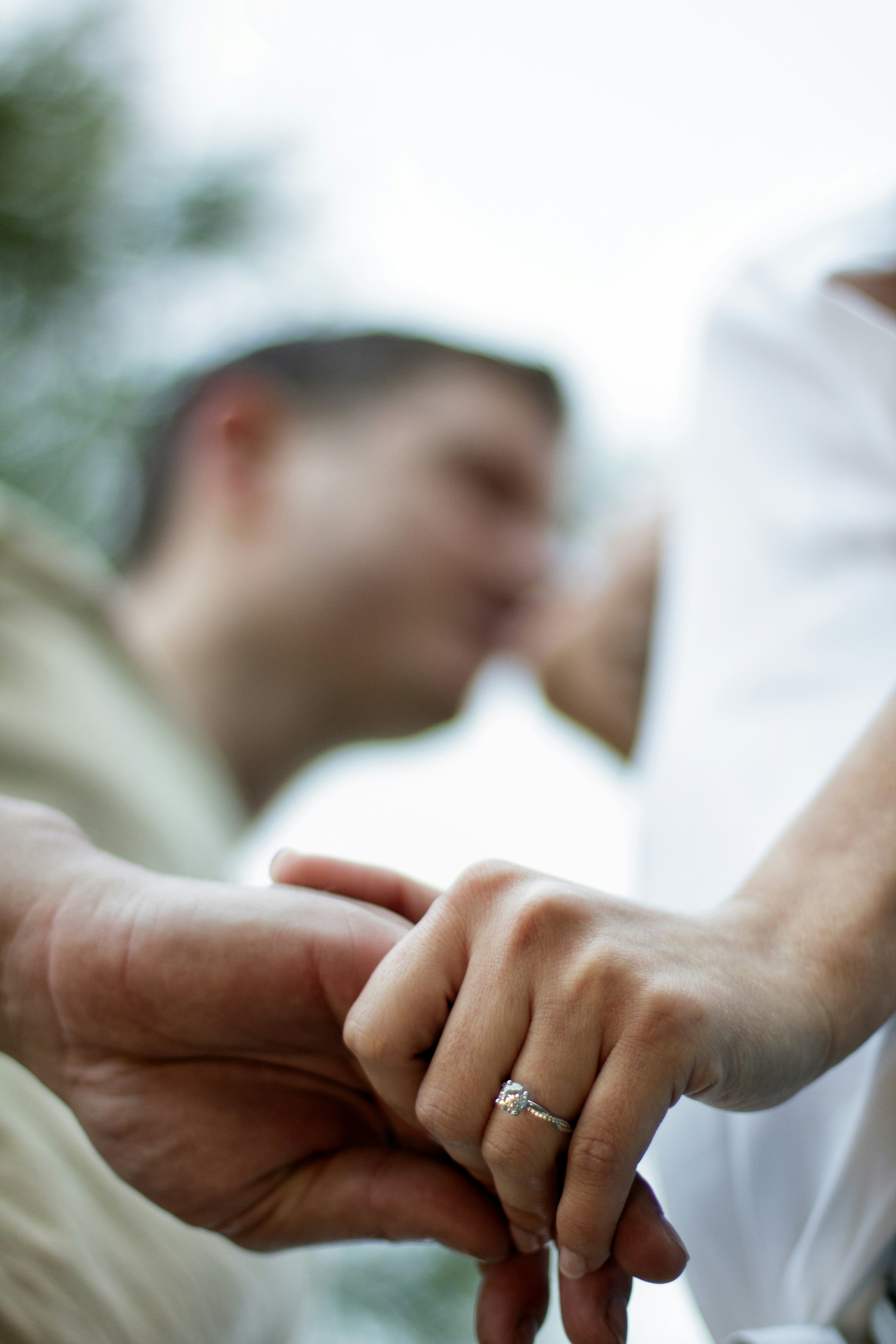 Close Grip, Quiet Promise: The Ring as Heart of a Soft-Focused Moment