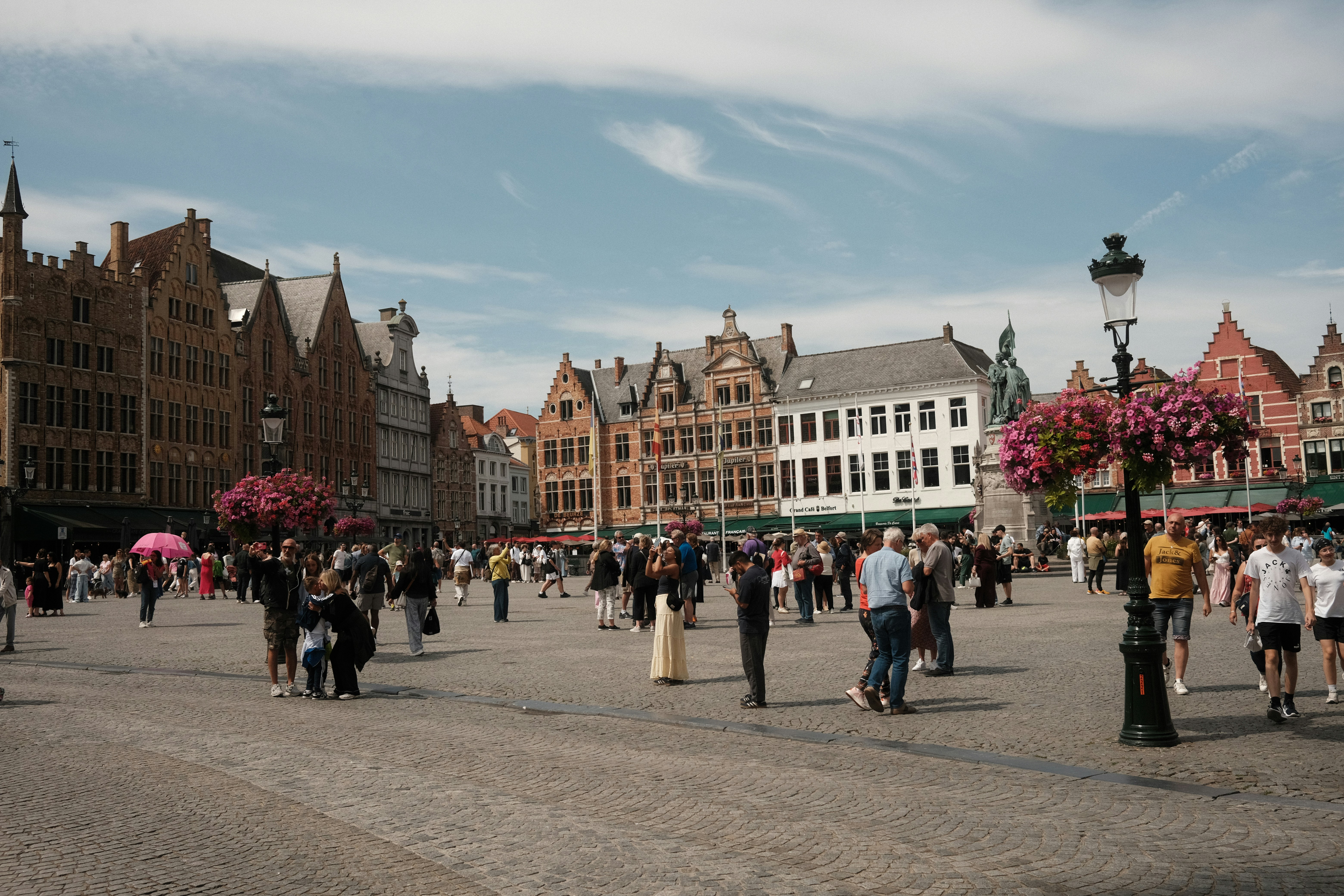 People walking in a european city square