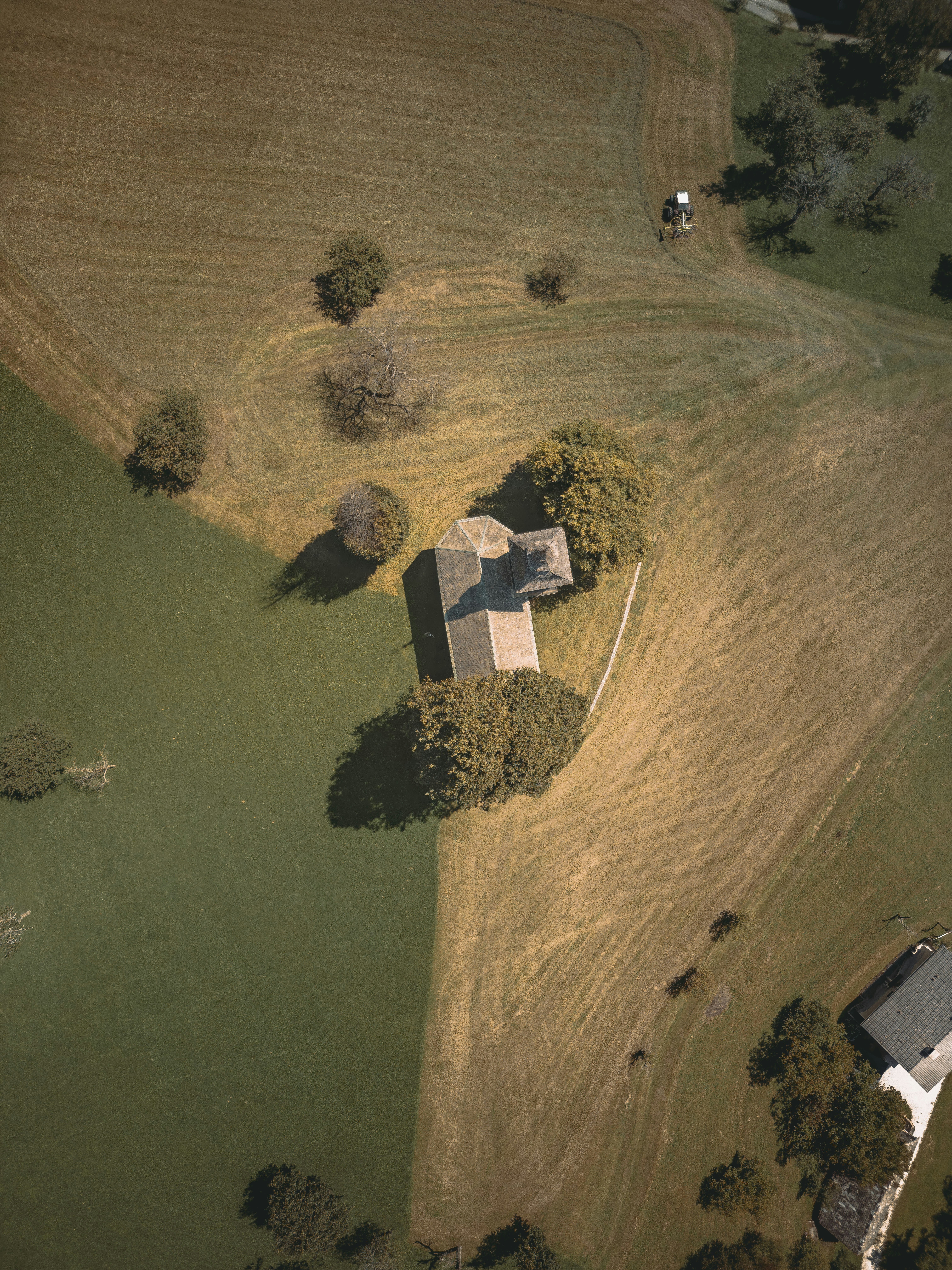 Aerial Serenity: The Homestead in the Green Expanses