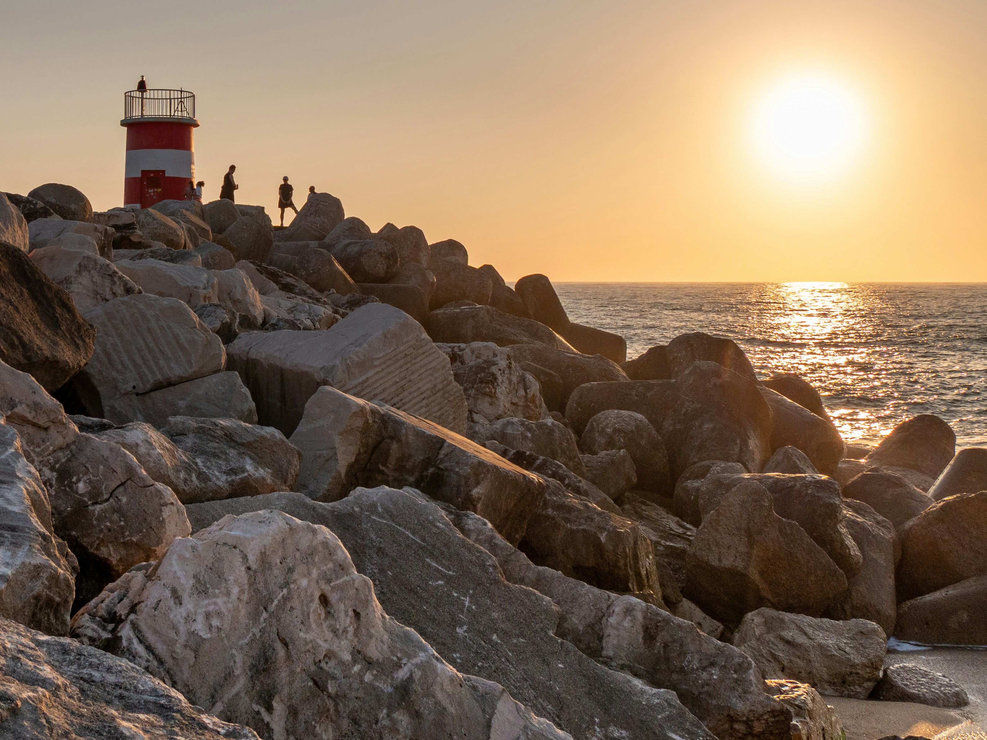 Guiding Light Amidst Rocky Shores
