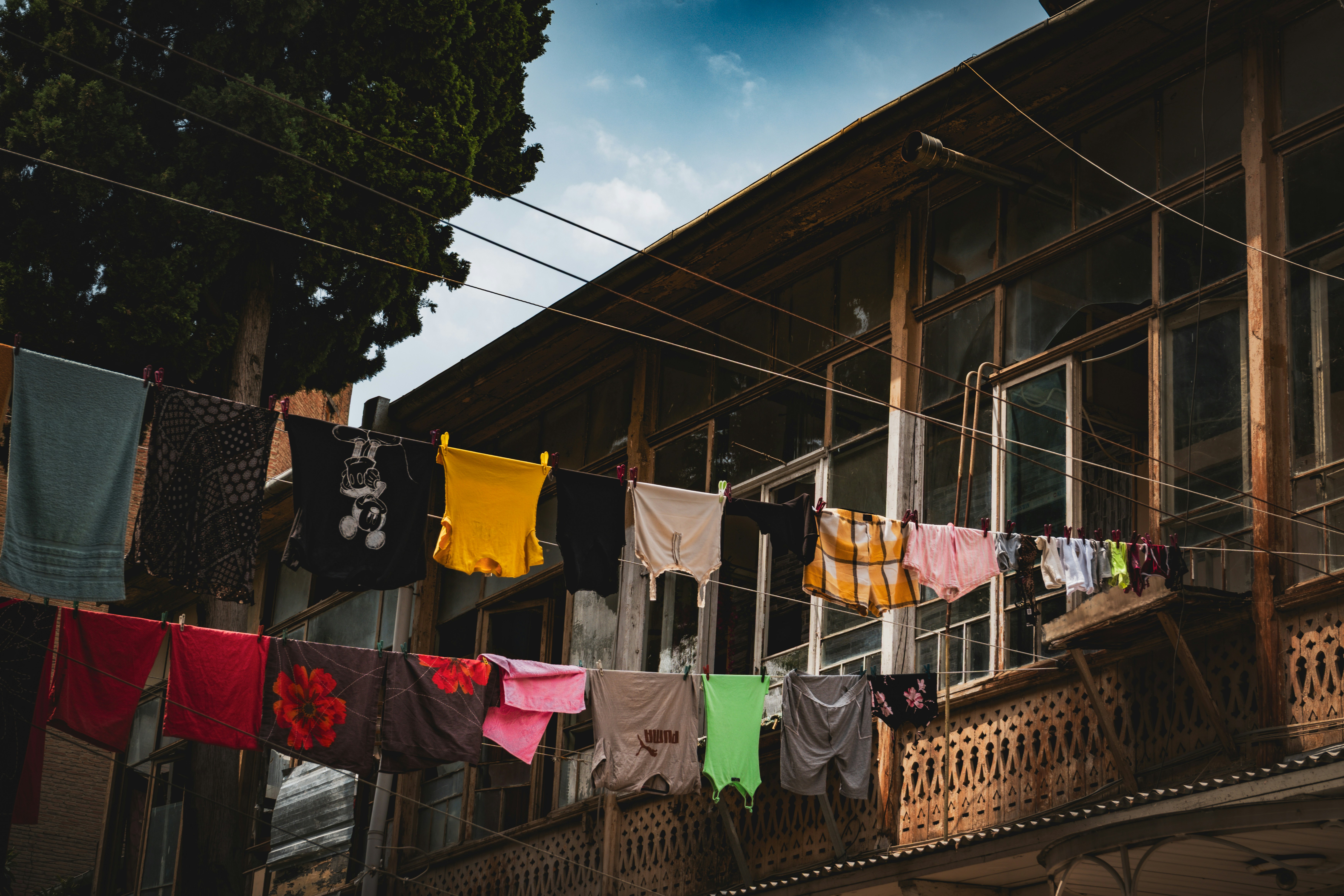 Clothes drying on a line outside a house